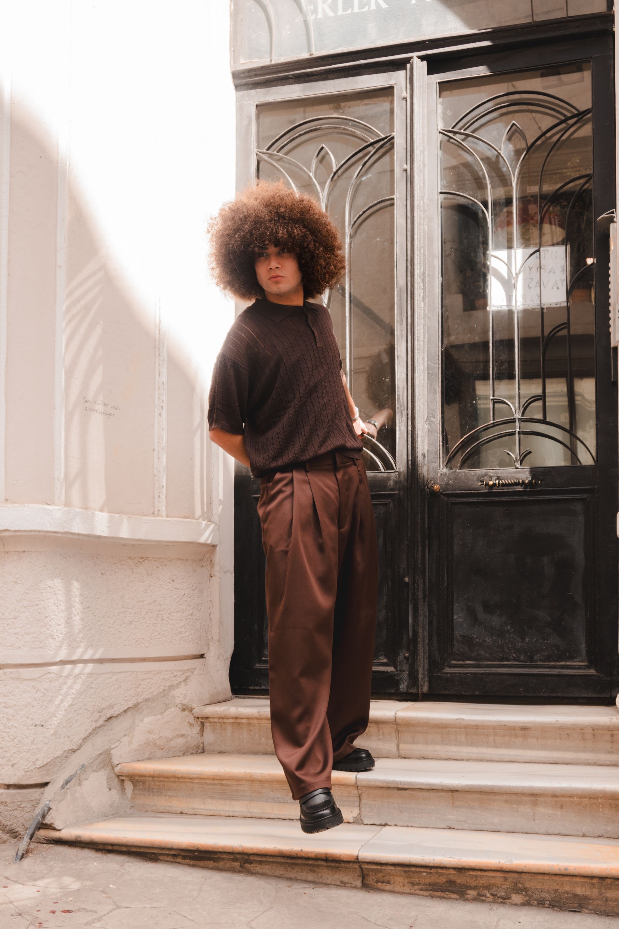 Standing in Steps Man in Brown Clothing · Free Stock Photo