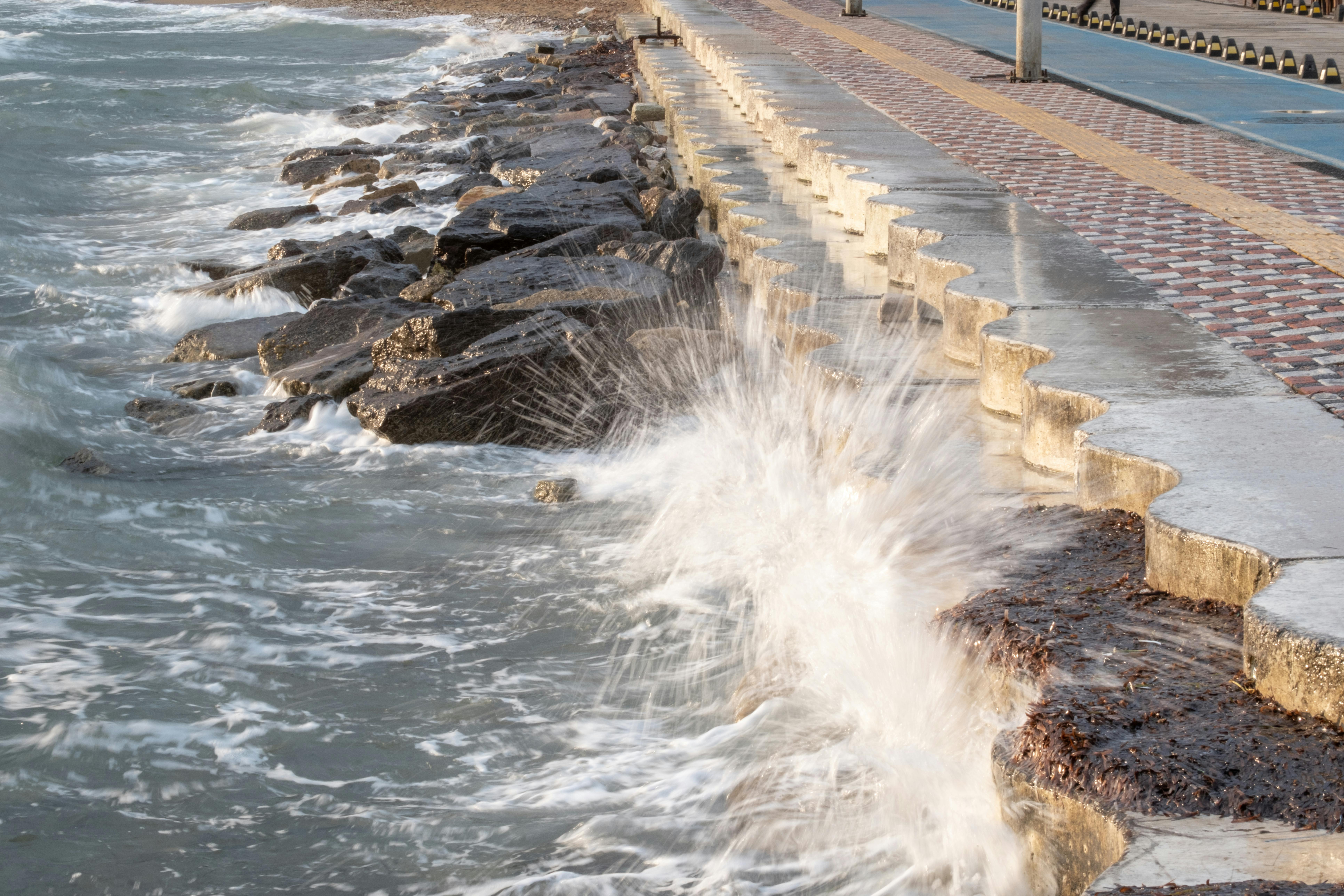 Wave Crushing on Pier on Seashore · Free Stock Photo