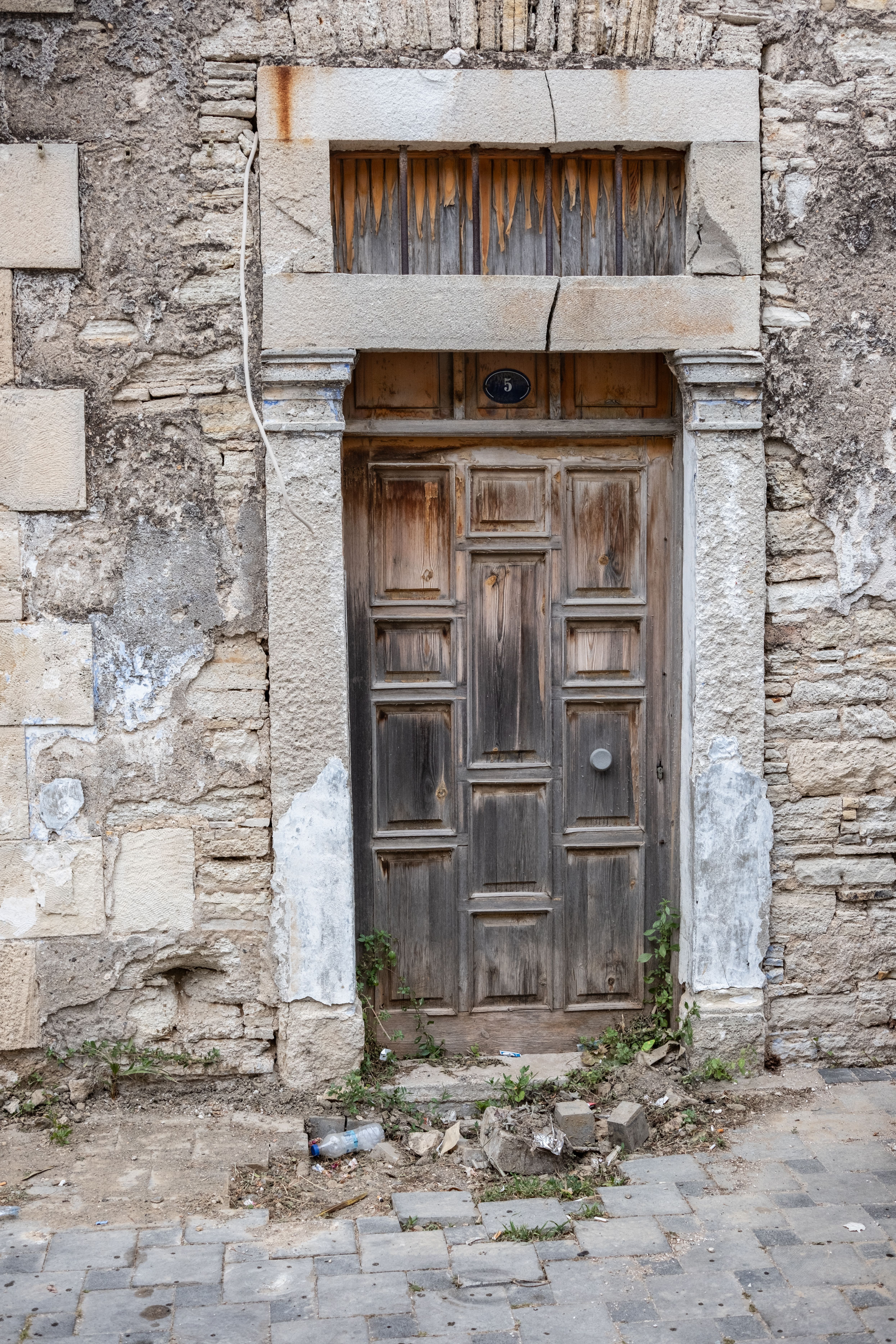 Wooden Door on a Cobblestone Street · Free Stock Photo