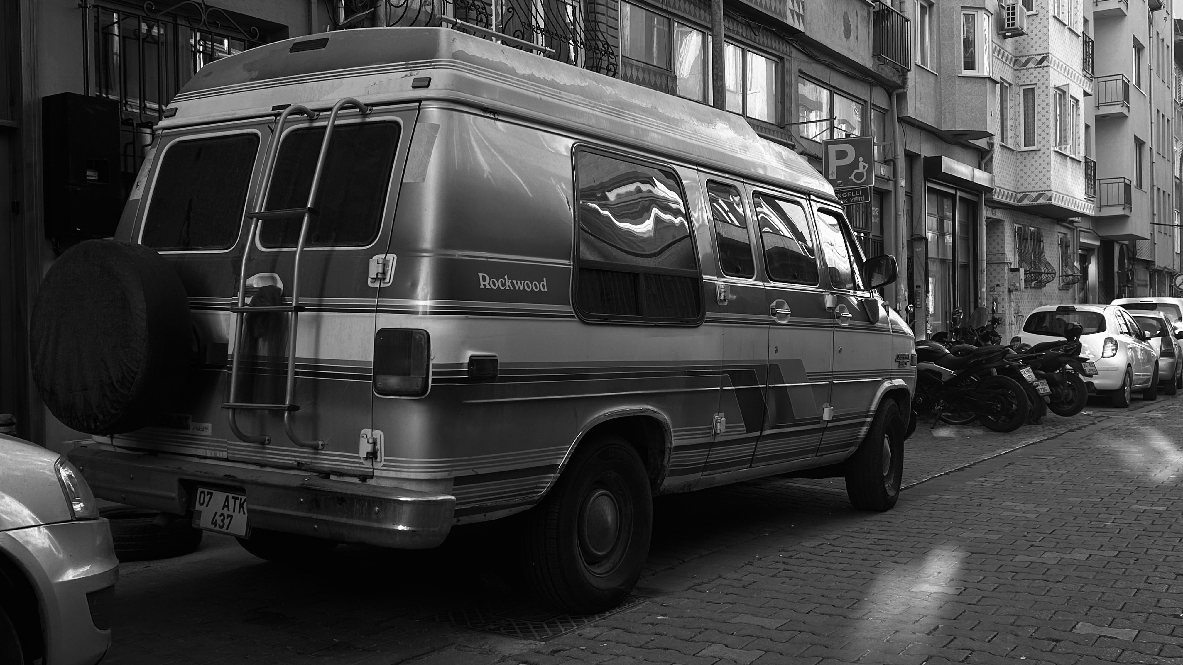 Black and White Photo of a Van Parked on the Side of a Street · Free ...