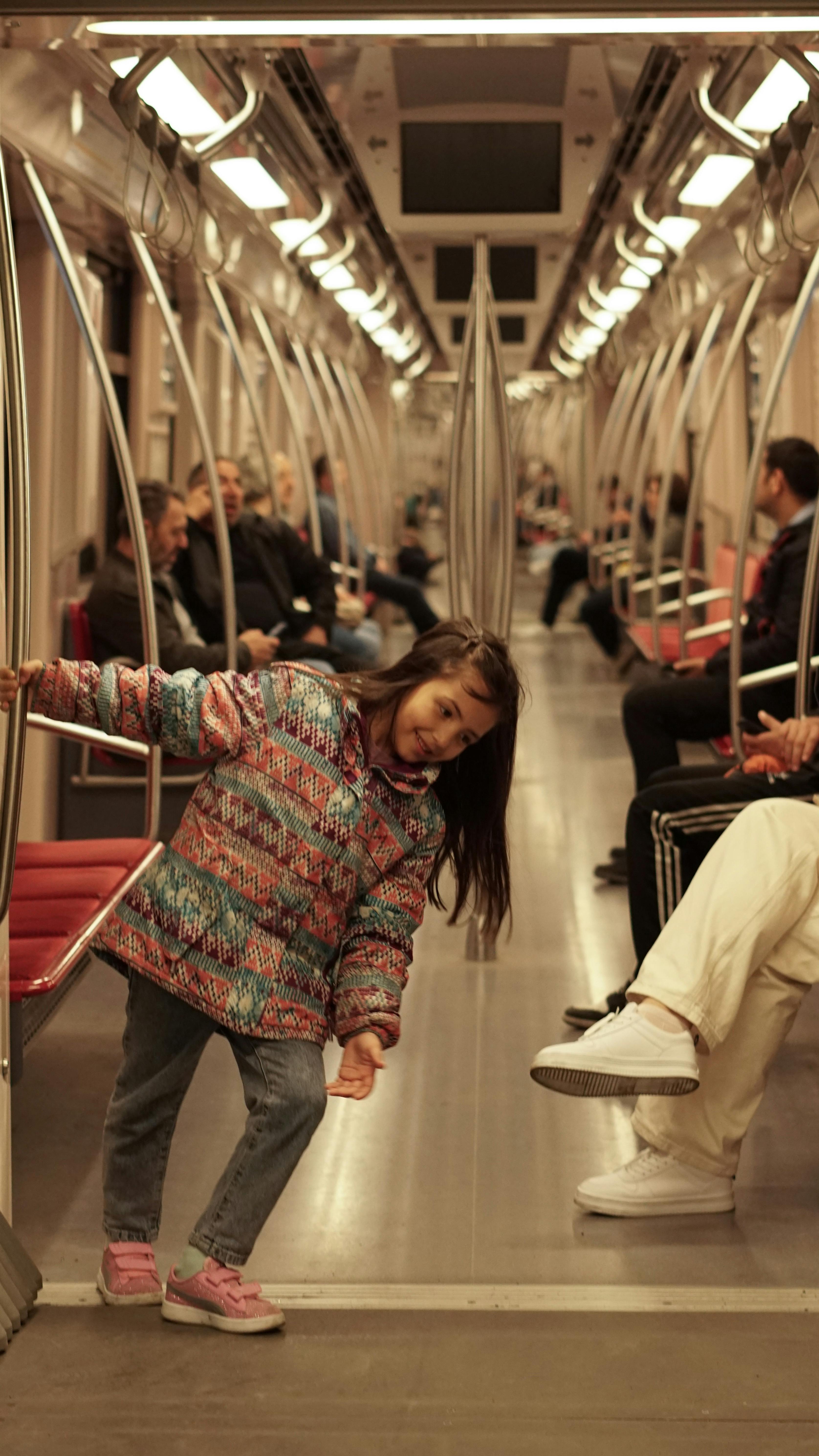 Photo of a Little Girl in a Subway · Free Stock Photo