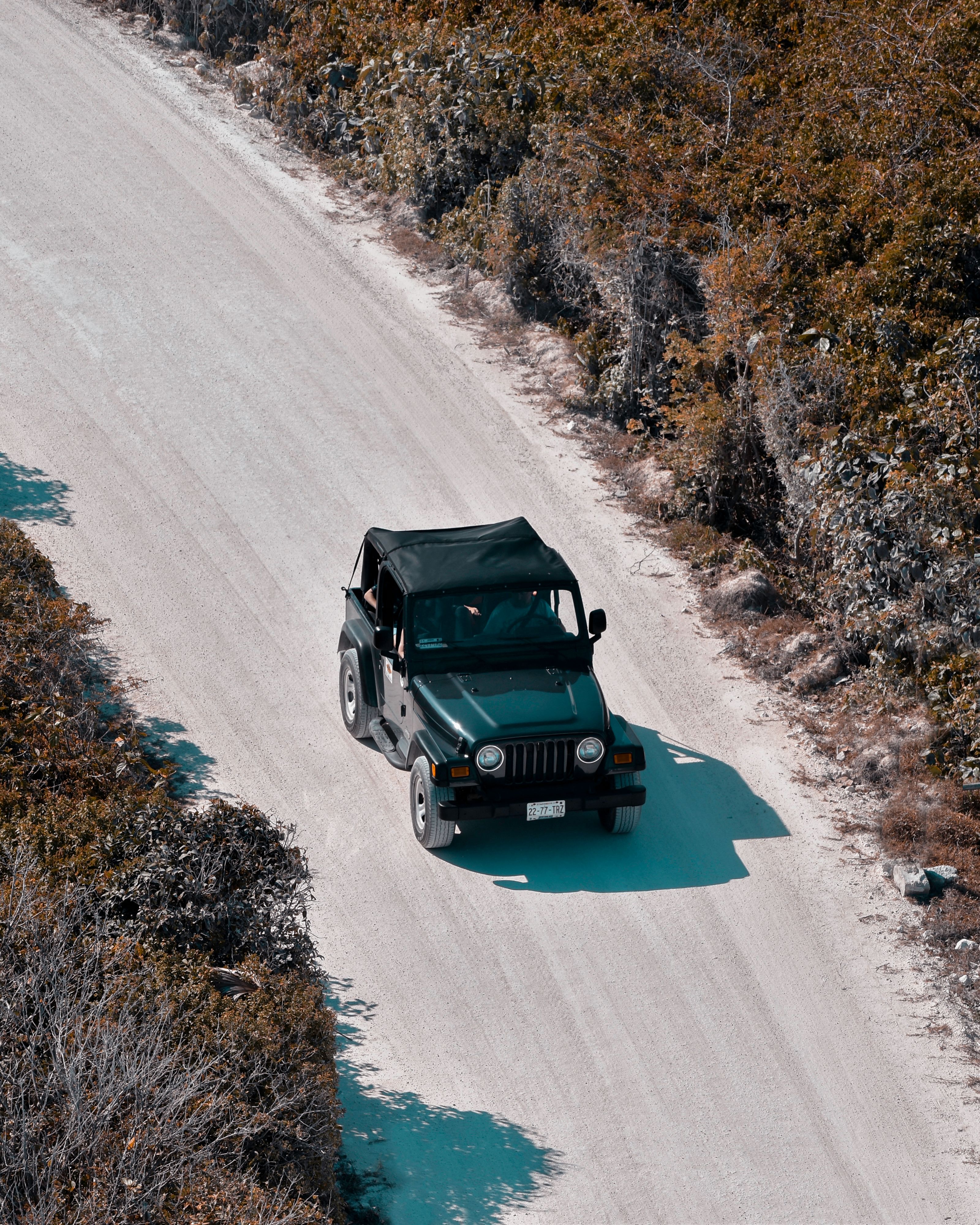 Aerial Photography of Black Jeep SUV on Road · Free Stock Photo