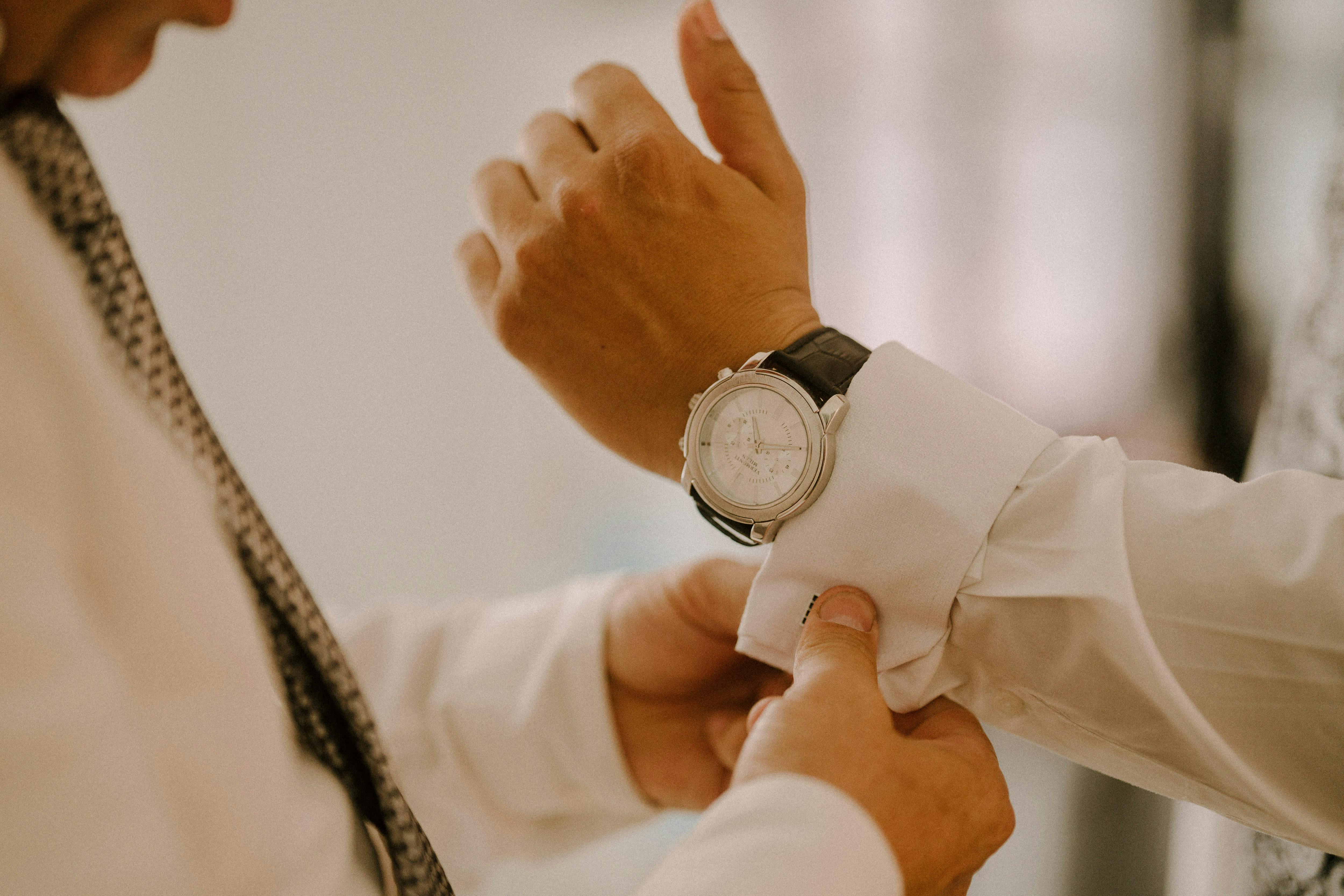Best Man Buttoning the Grooms Cuff · Free Stock Photo