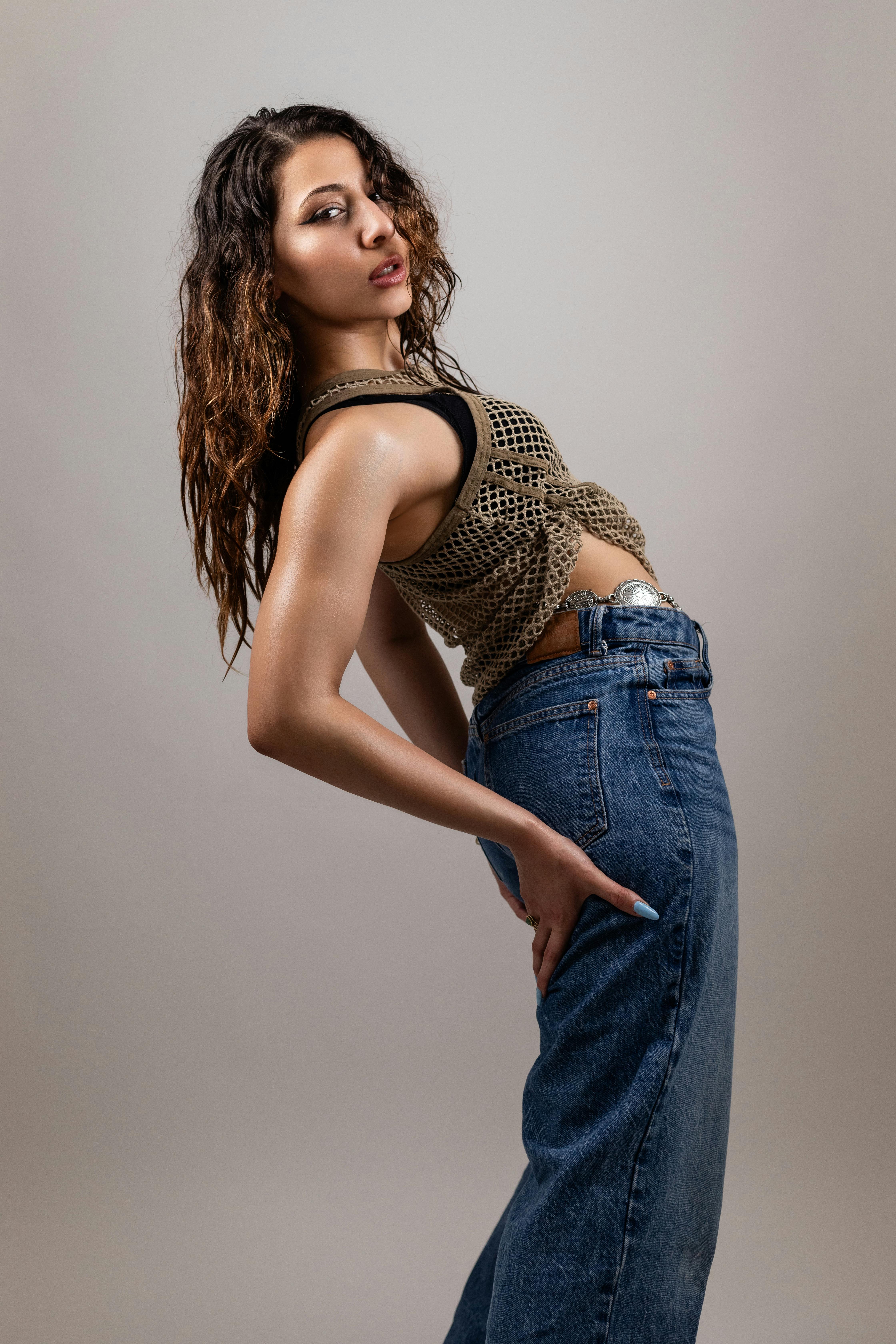 Woman in Tank Top Bending · Free Stock Photo