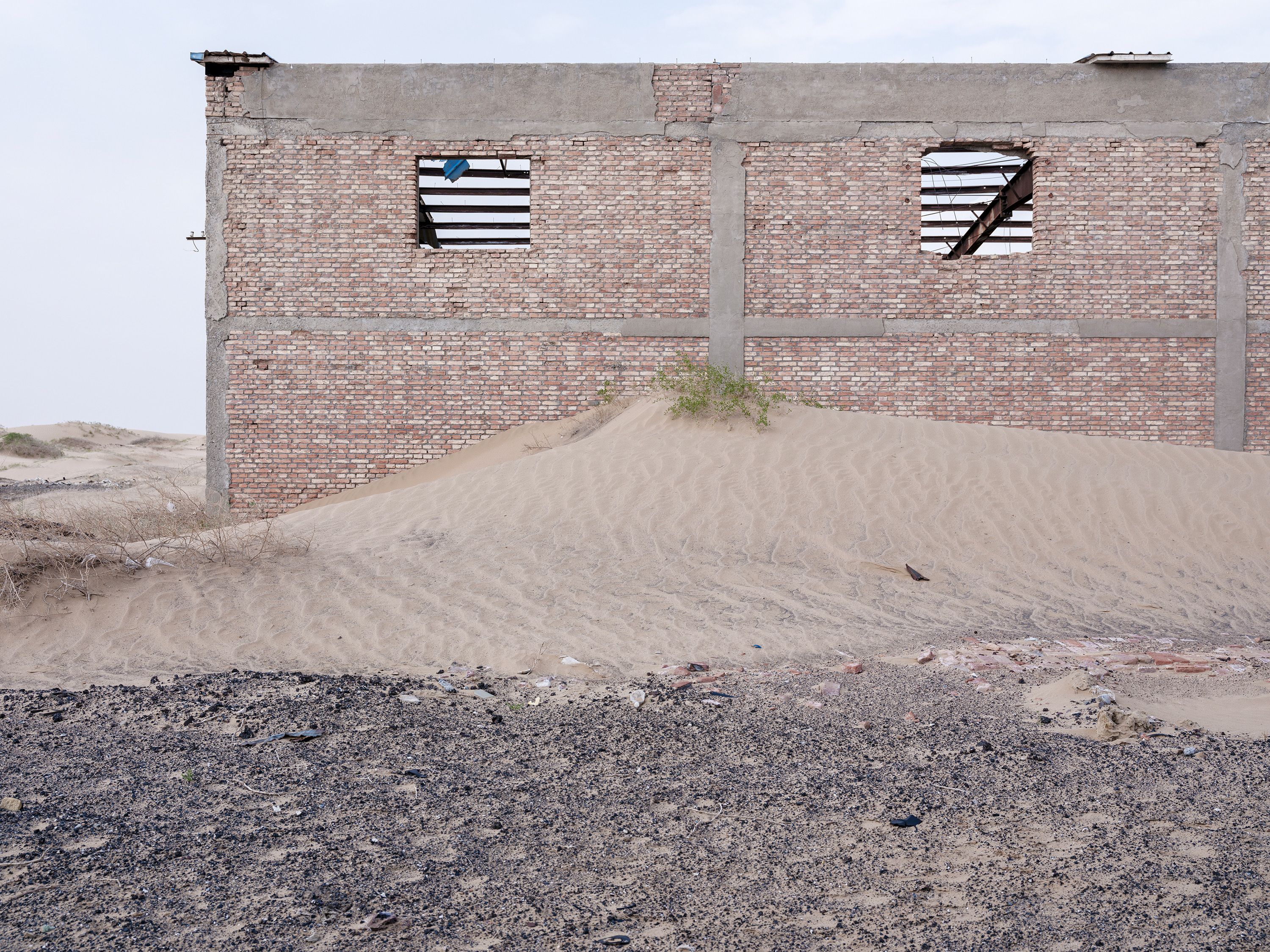 Brick Building on a Desert · Free Stock Photo