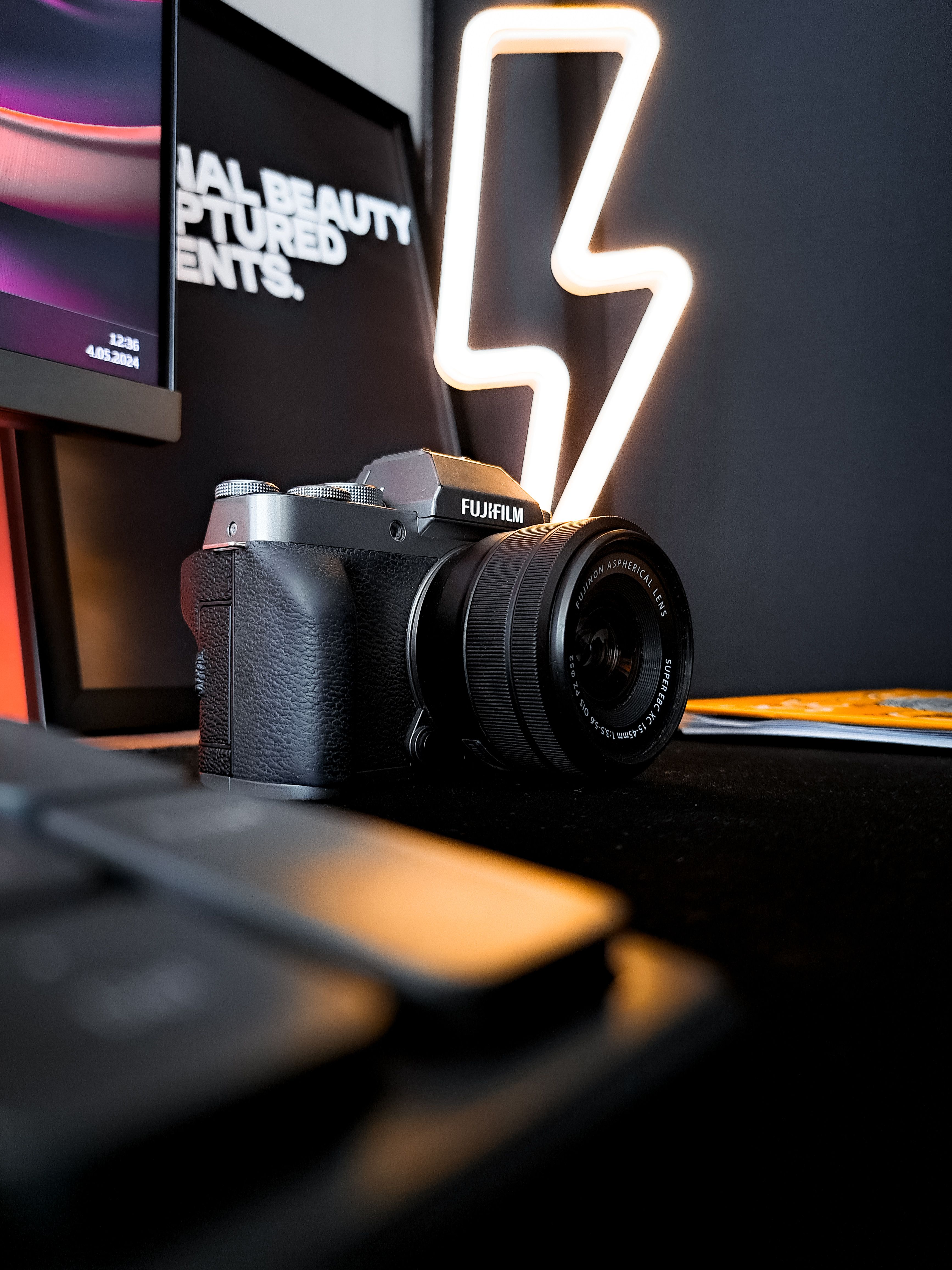 Fujifilm X-T200 Digital Camera on the Desk Next to the Keyboard and ...