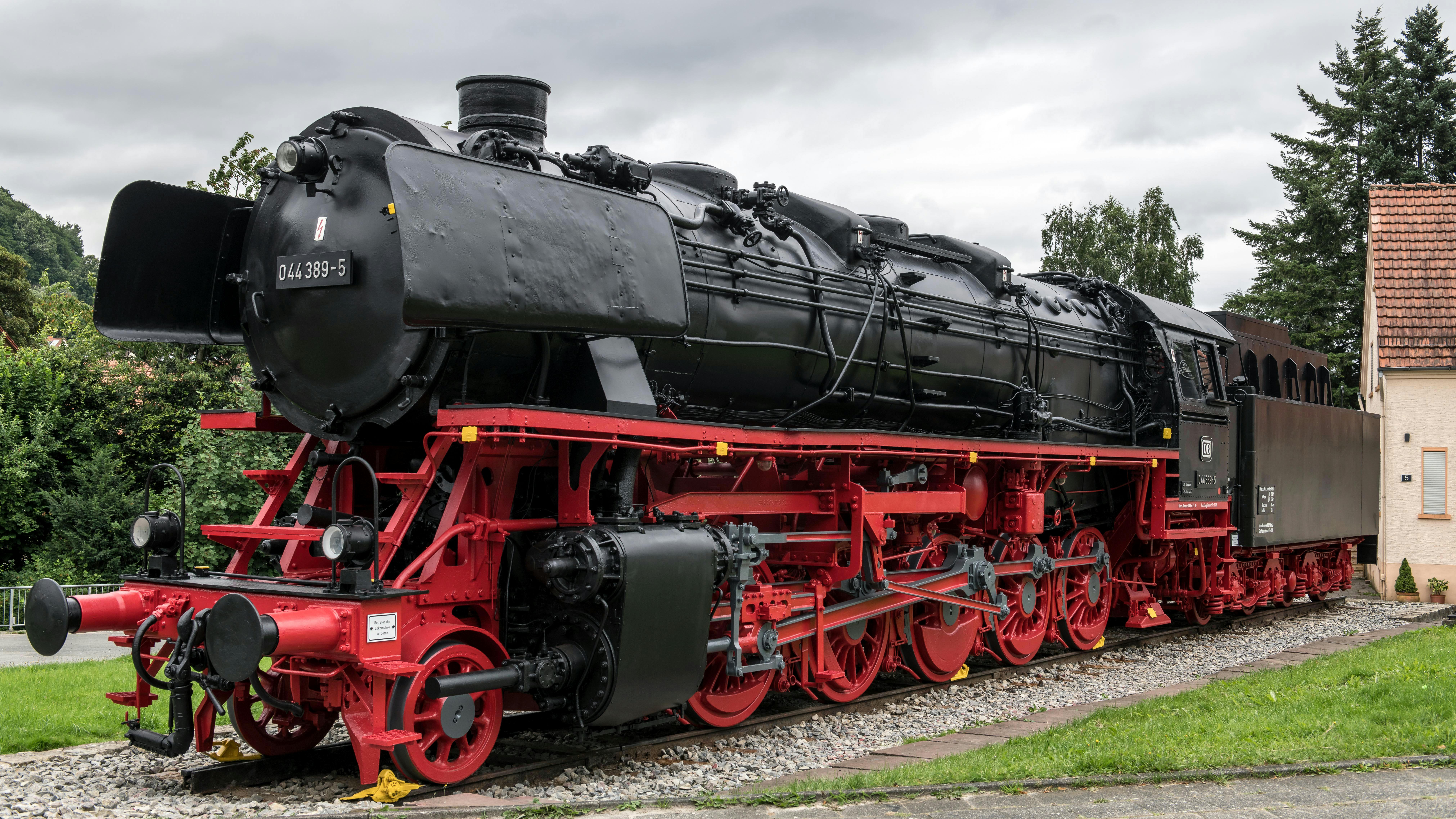 Historic Steam Locomotive with a Coal Car · Free Stock Photo