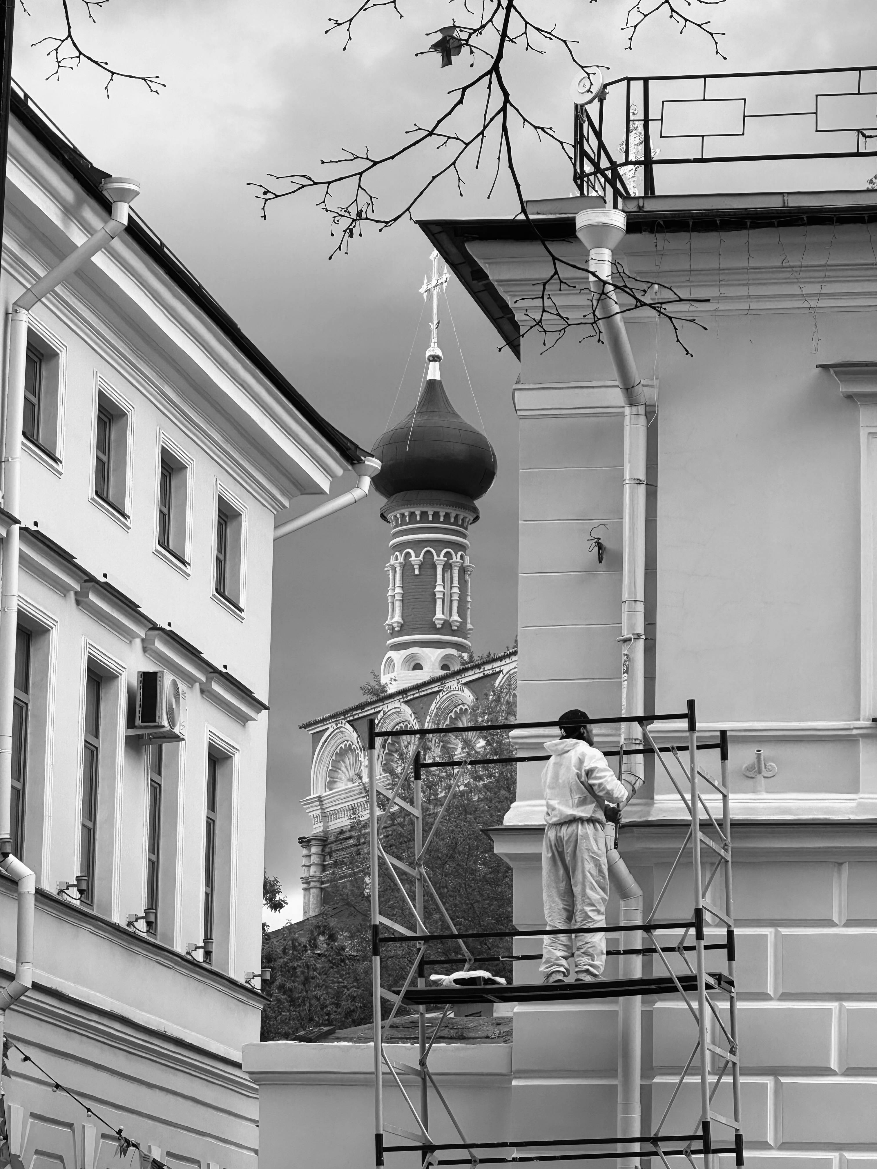 A Man on a Scaffolding · Free Stock Photo