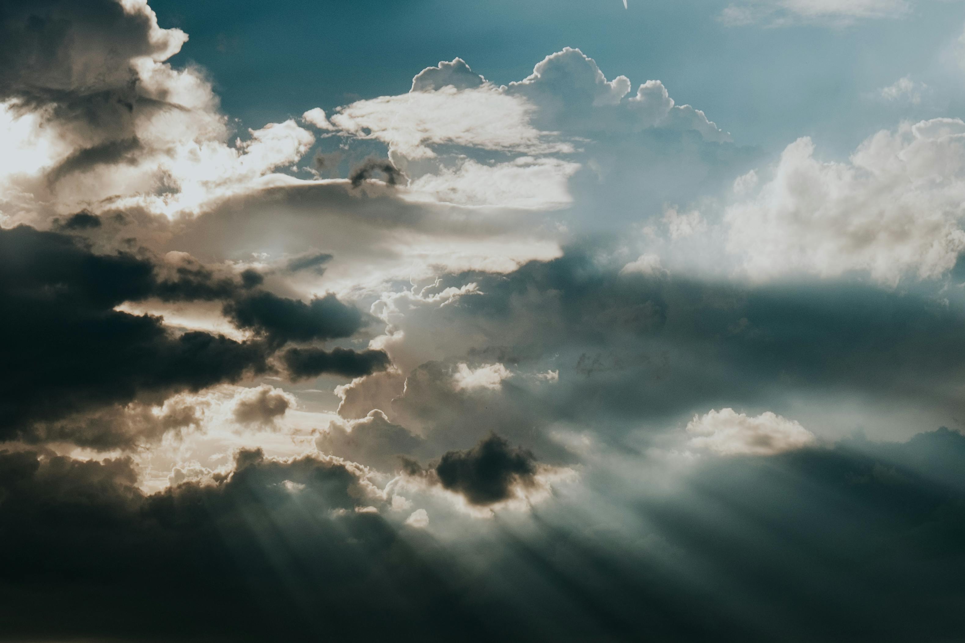 Light Piercing Through Clouds · Free Stock Photo