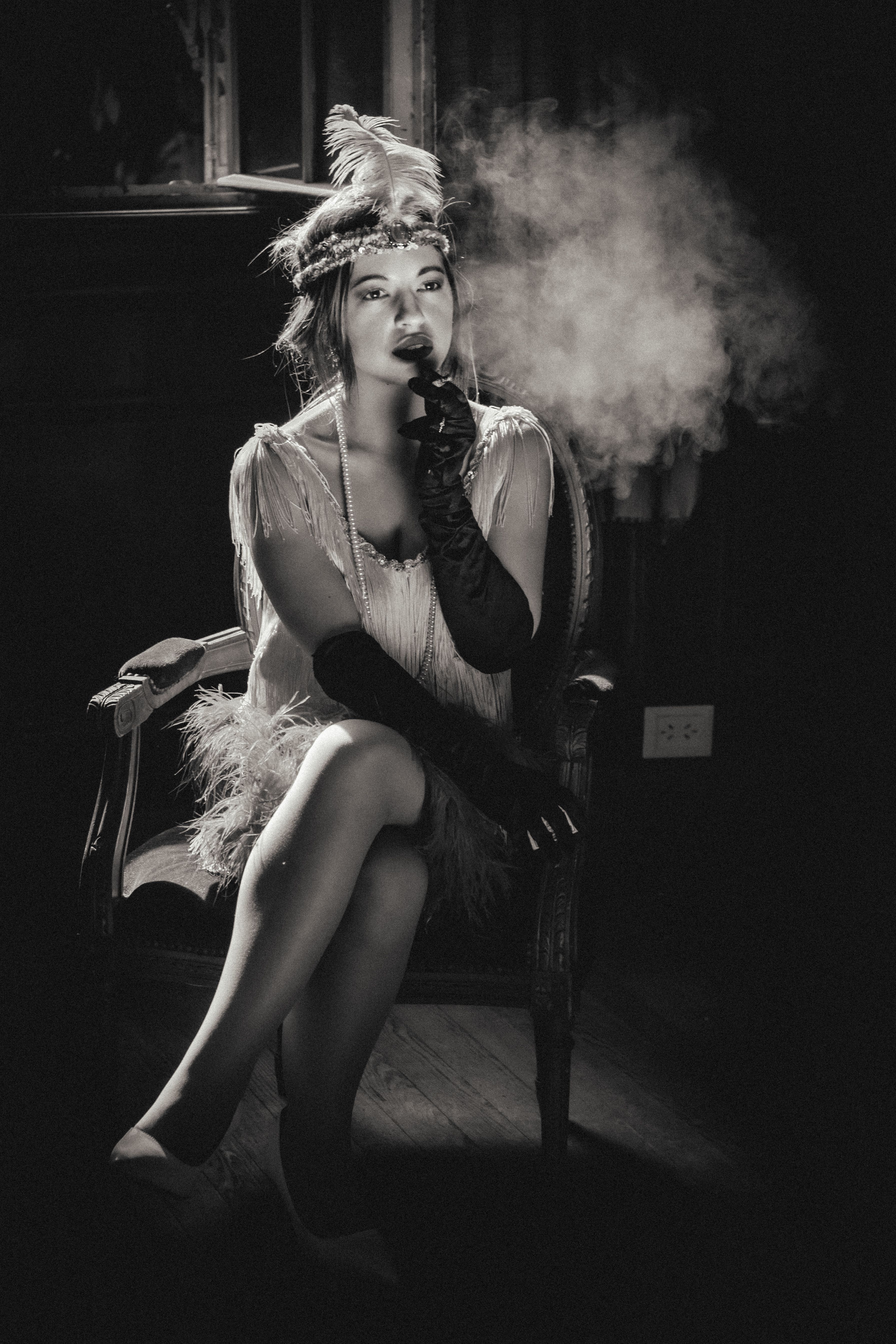 Woman in Dress and High Heels Smoking Cigarette · Free Stock Photo