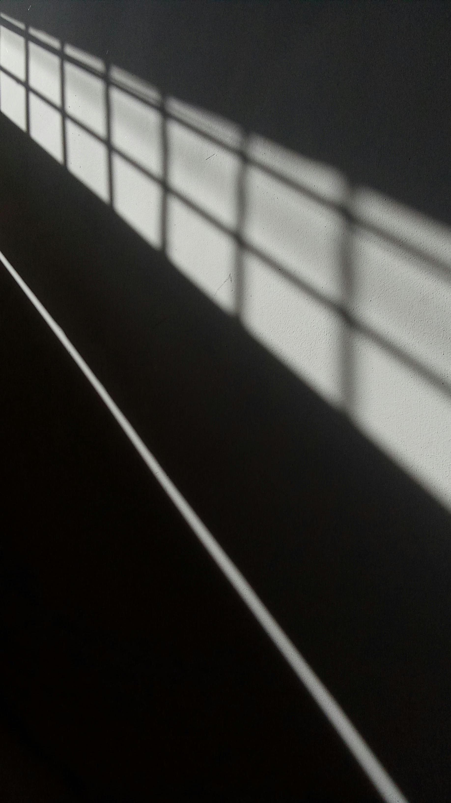 Sunlight and Shadow on Wall · Free Stock Photo
