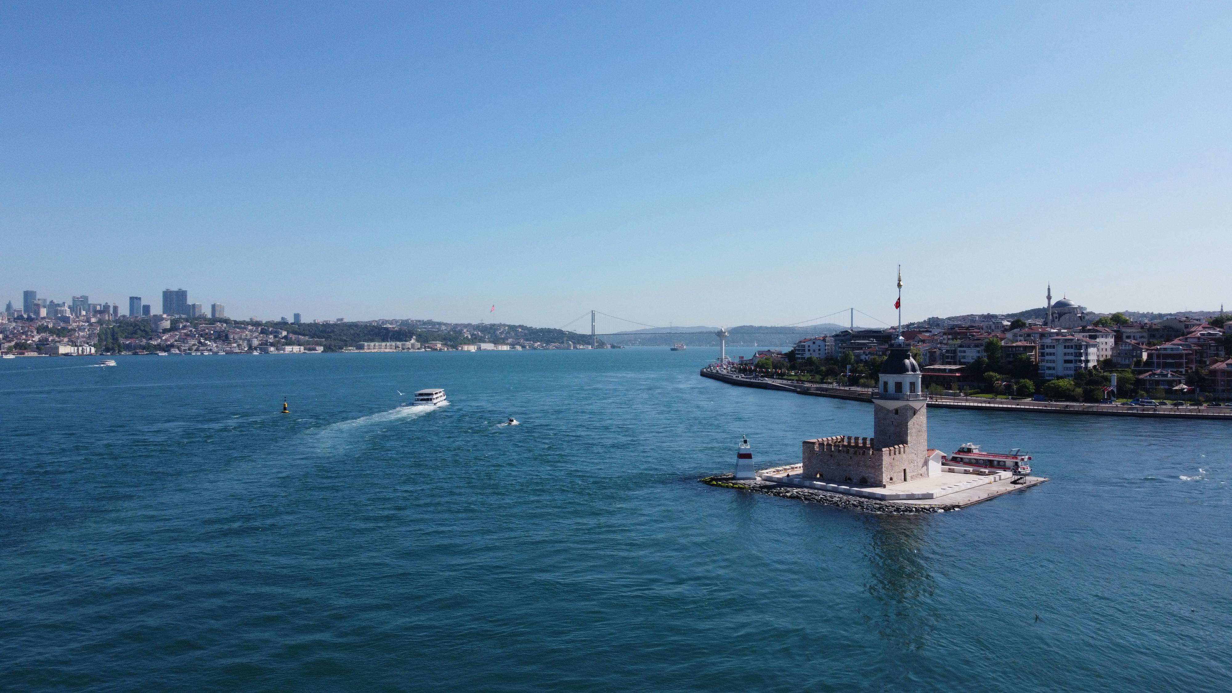 The view from the top of a building overlooking the water · Free Stock ...