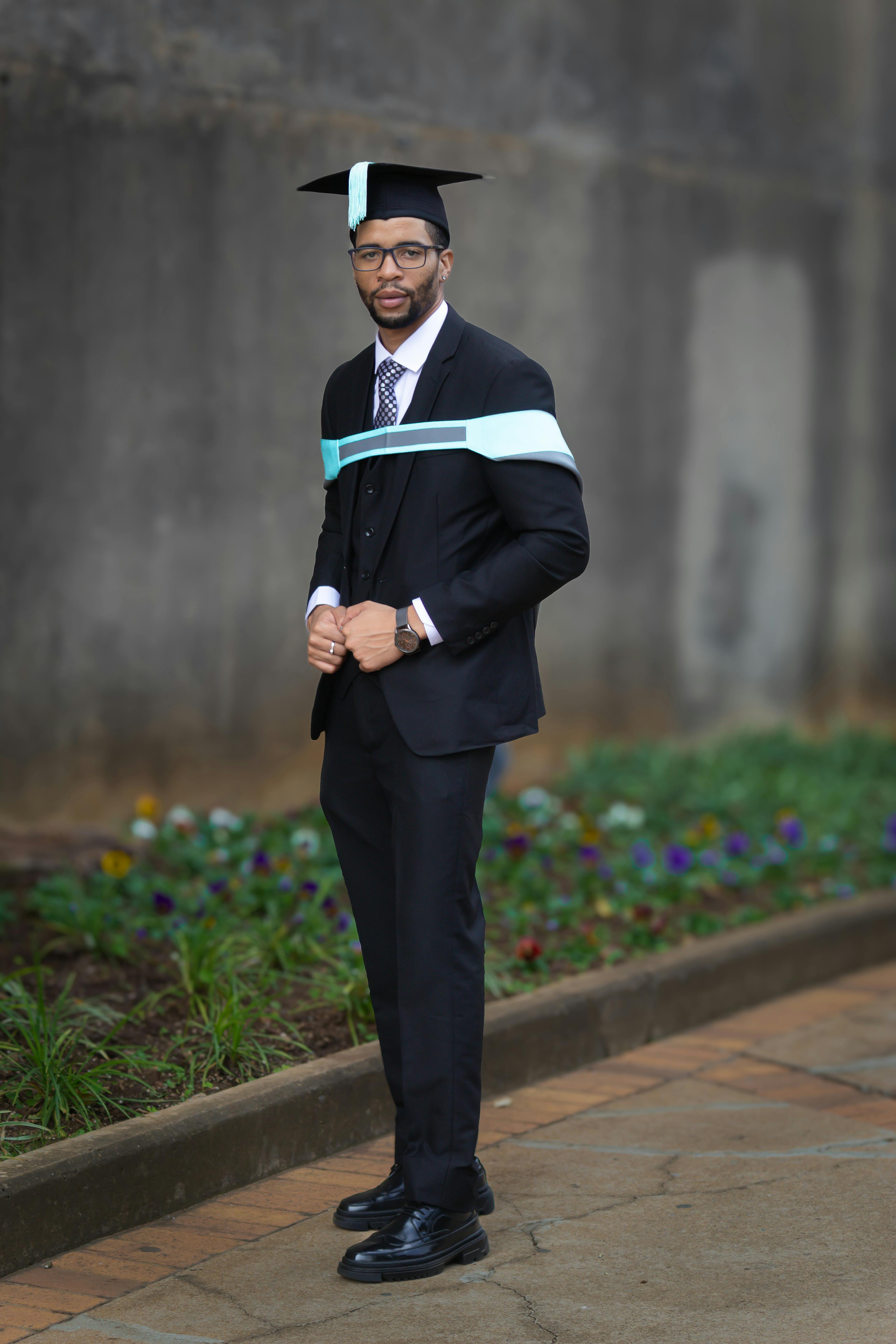 Man in Black Suit and Academic Hat · Free Stock Photo