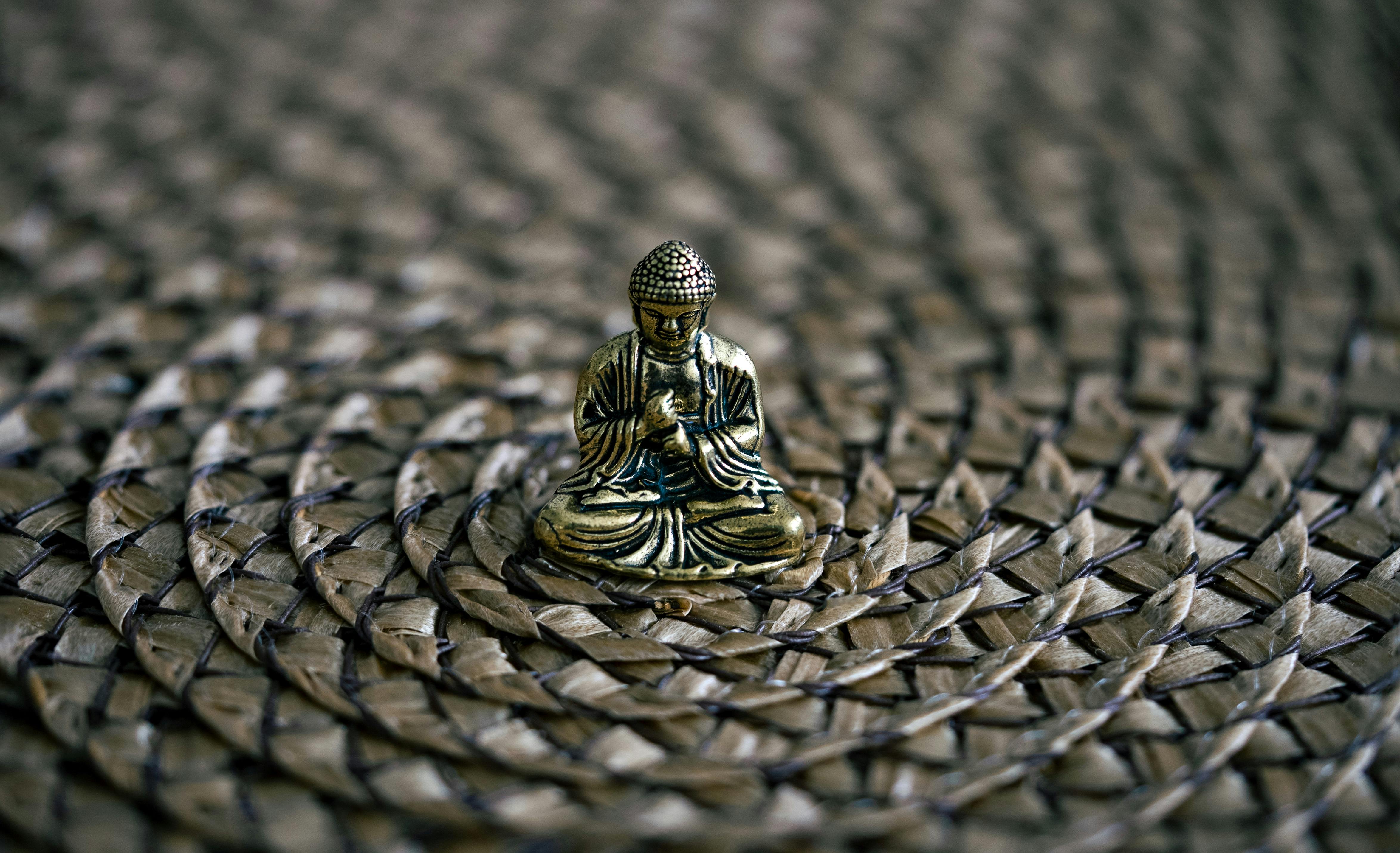 Close-up of a Small Buddha Figurine · Free Stock Photo