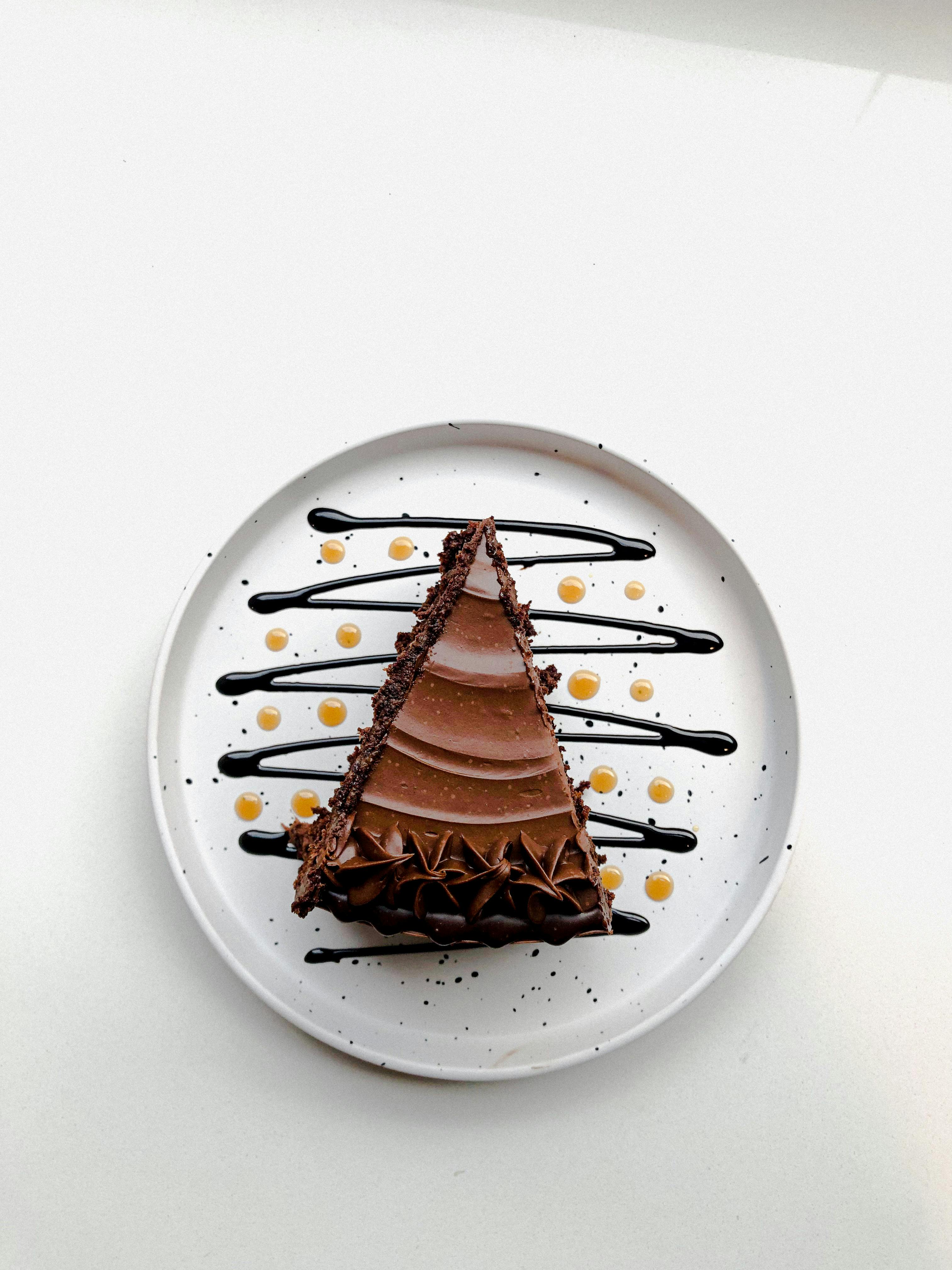 Top View of a Piece of Chocolate Cake on a Plate · Free Stock Photo