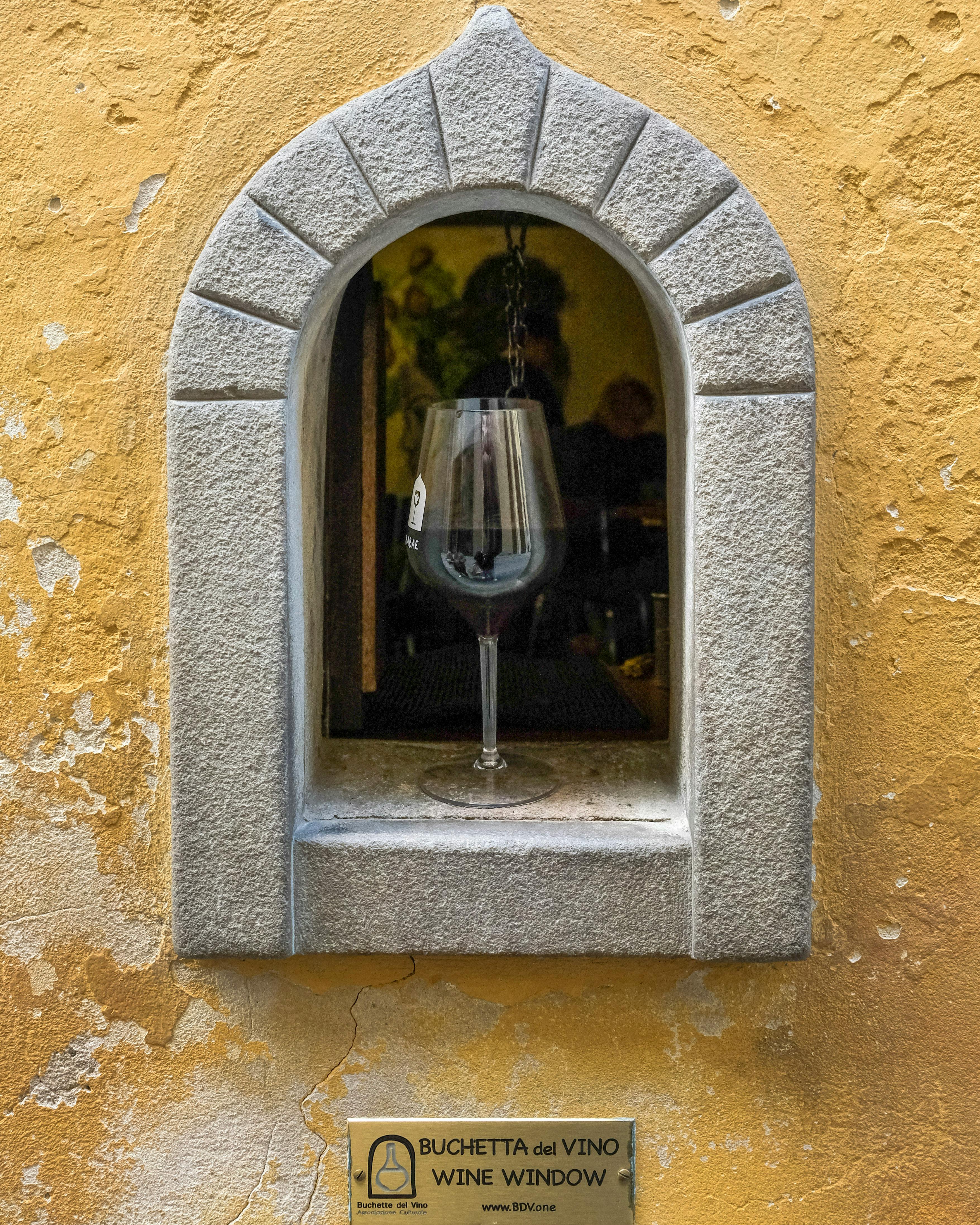 Close-up of a Glass of Red Wine Standing in the Buchetta del Vino Wine ...