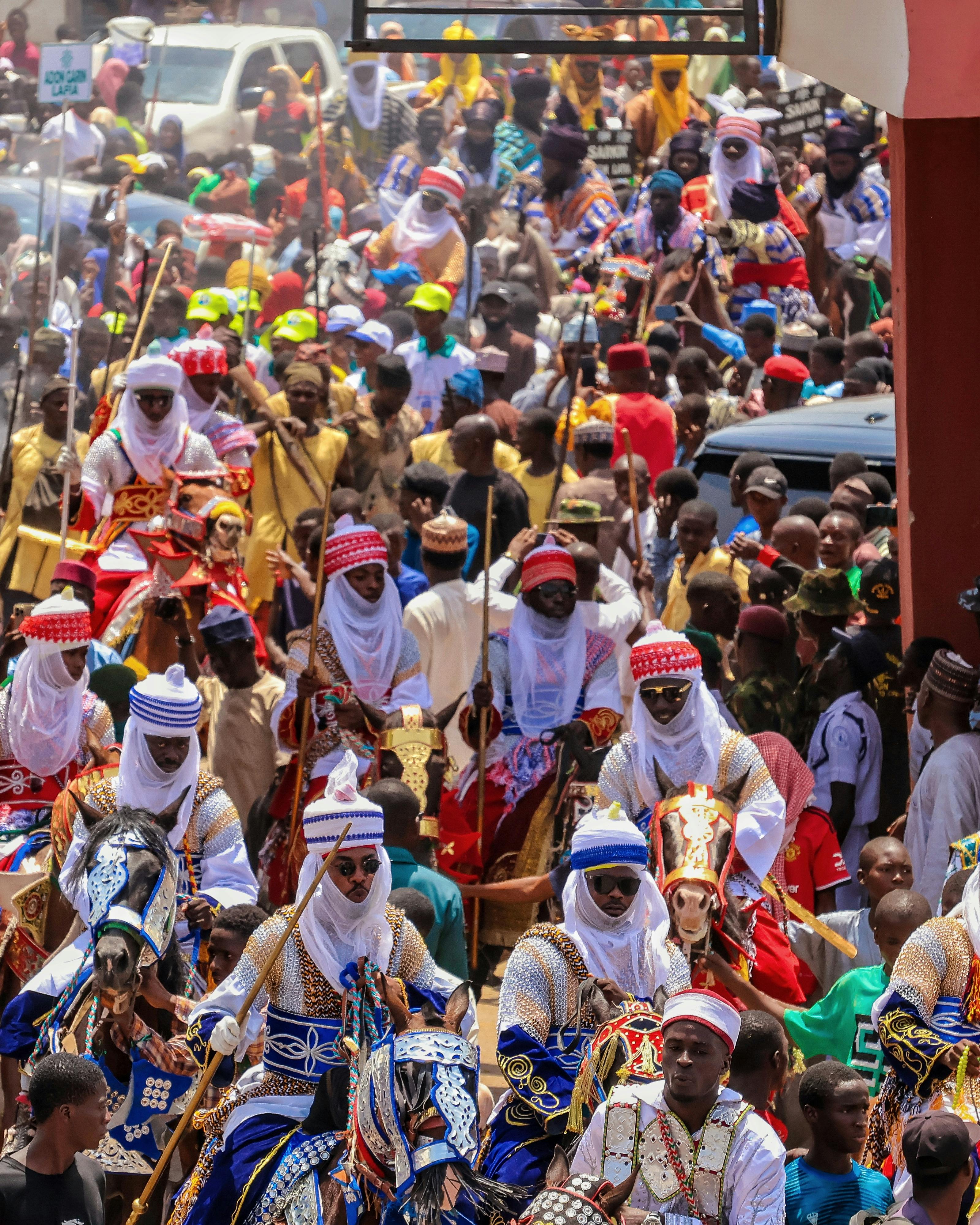 A large crowd of people dressed in colorful costumes · Free Stock Photo