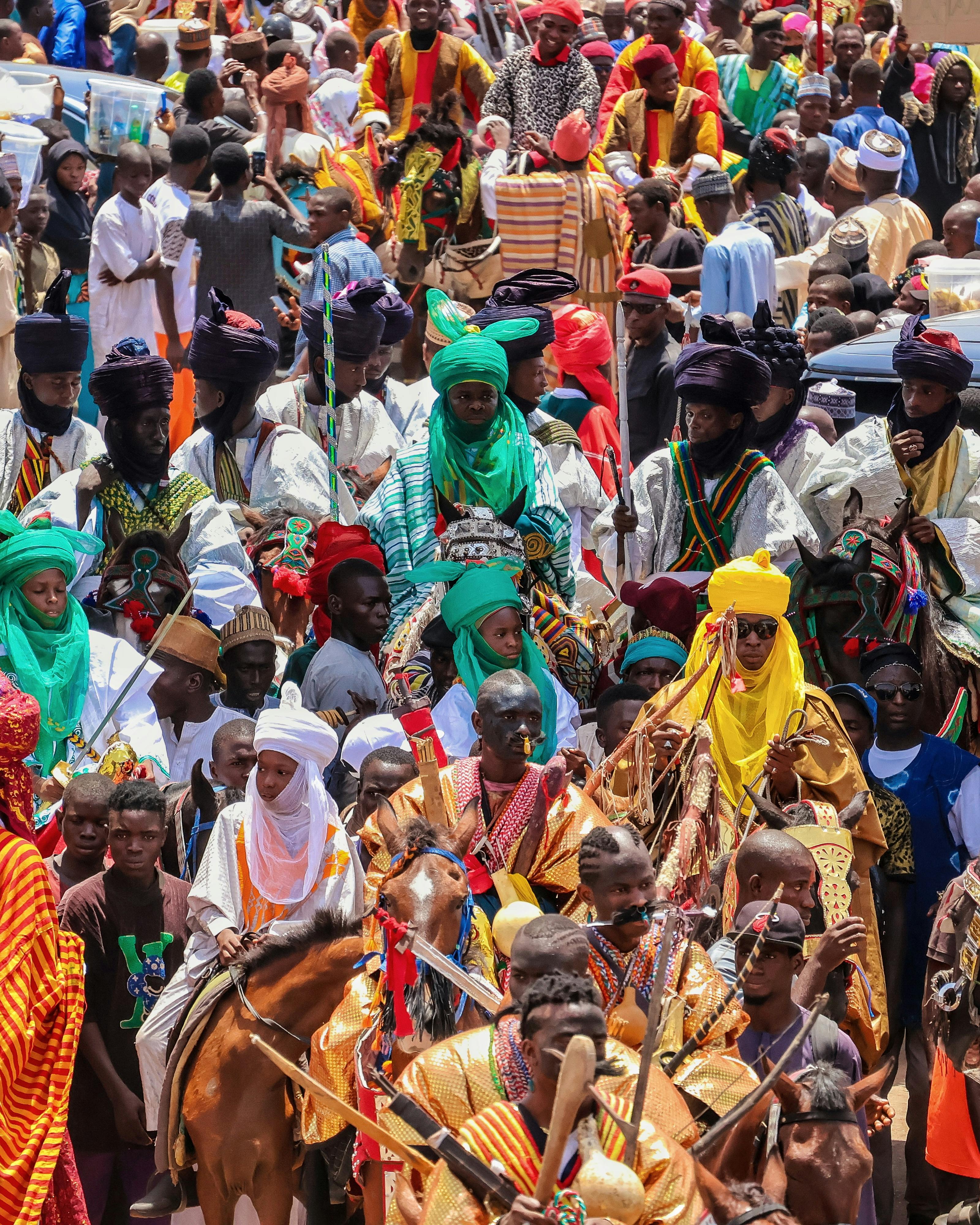 Parade of People in Traditional Clothing between Crowd of People · Free ...