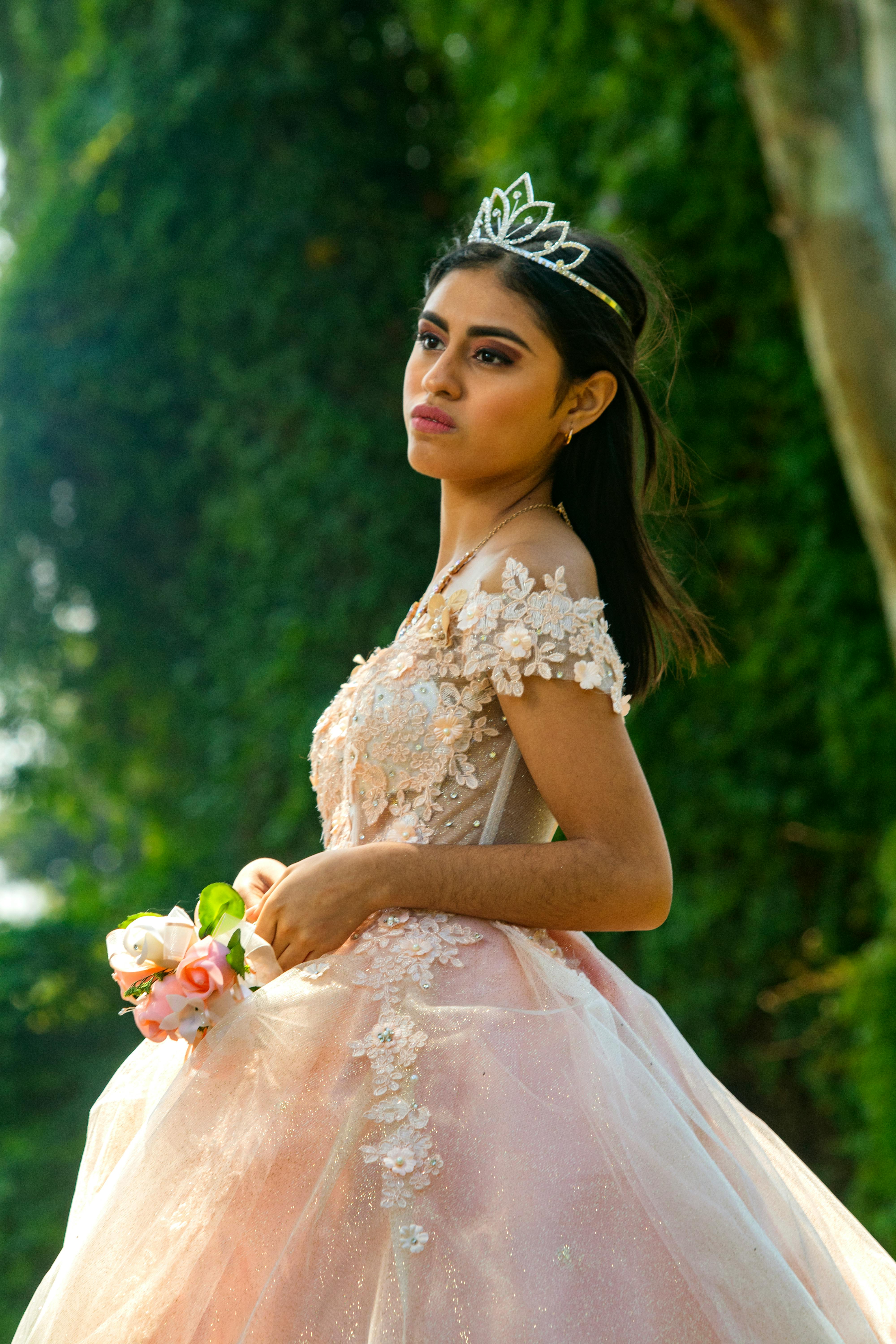 Standing Princess Holding Flowers · Free Stock Photo