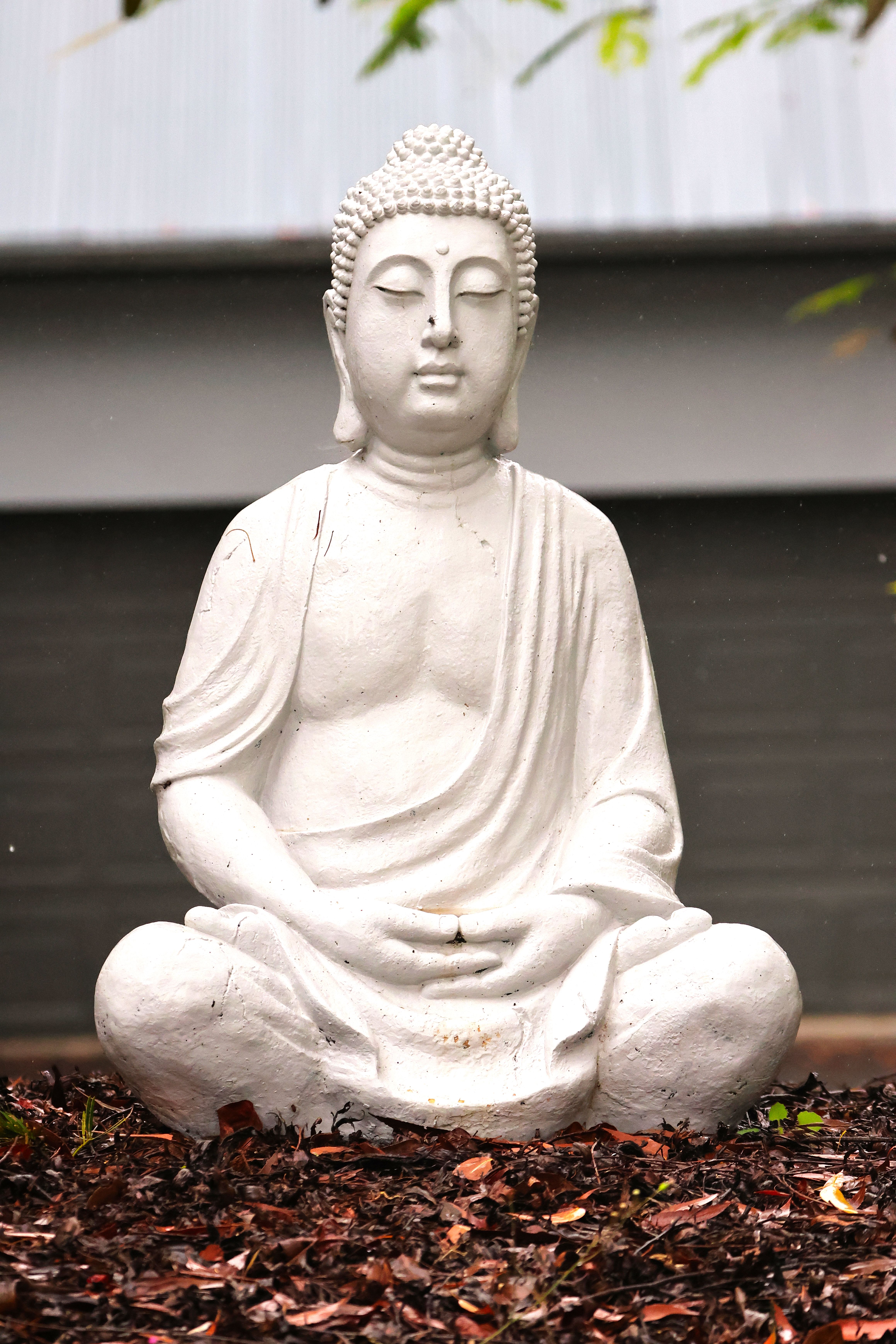 White Stone Statue of Sitting Cross-Legged Buddha · Free Stock Photo