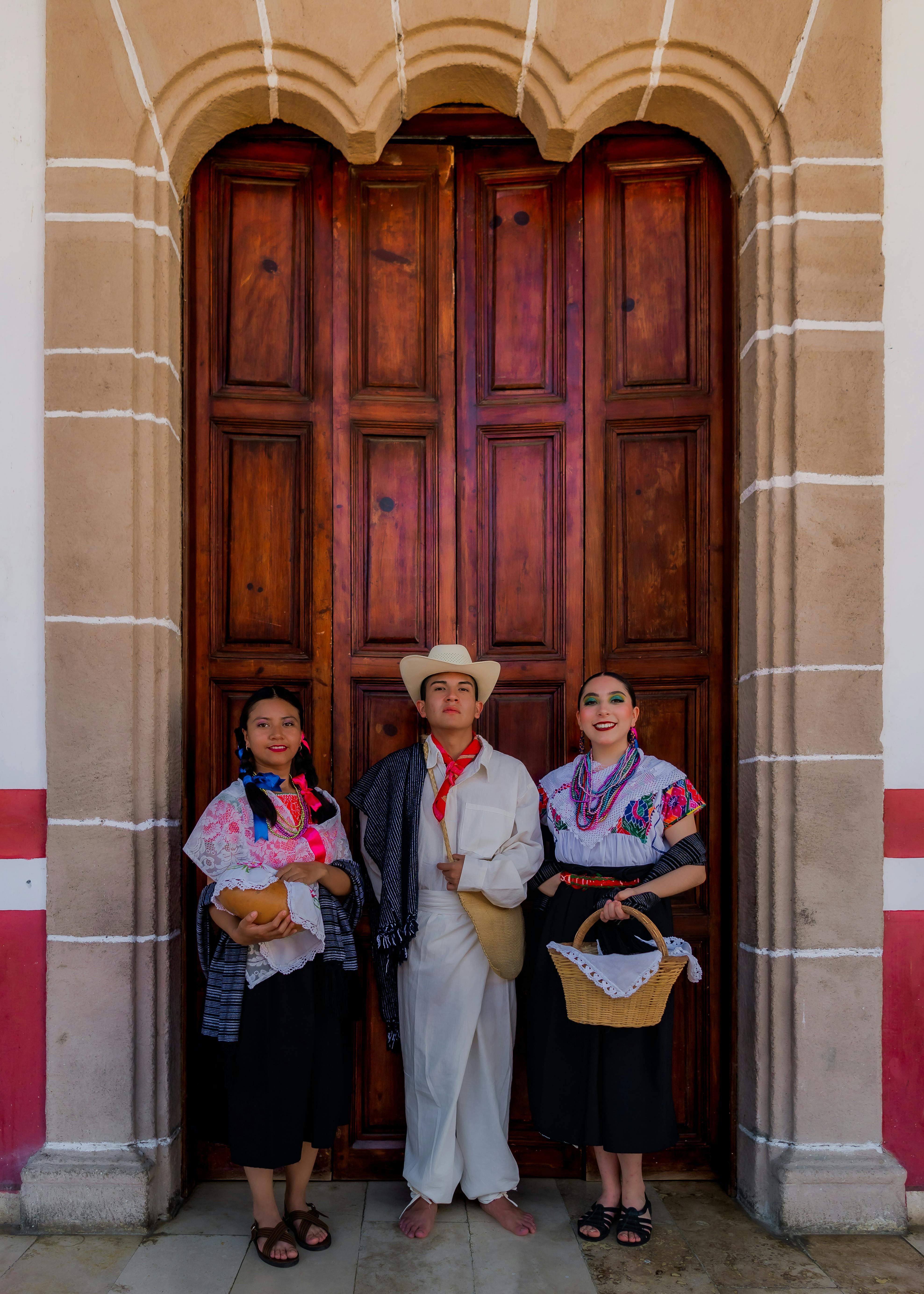 Photo of a Group of People Wearing Traditional Clothing · Free Stock Photo
