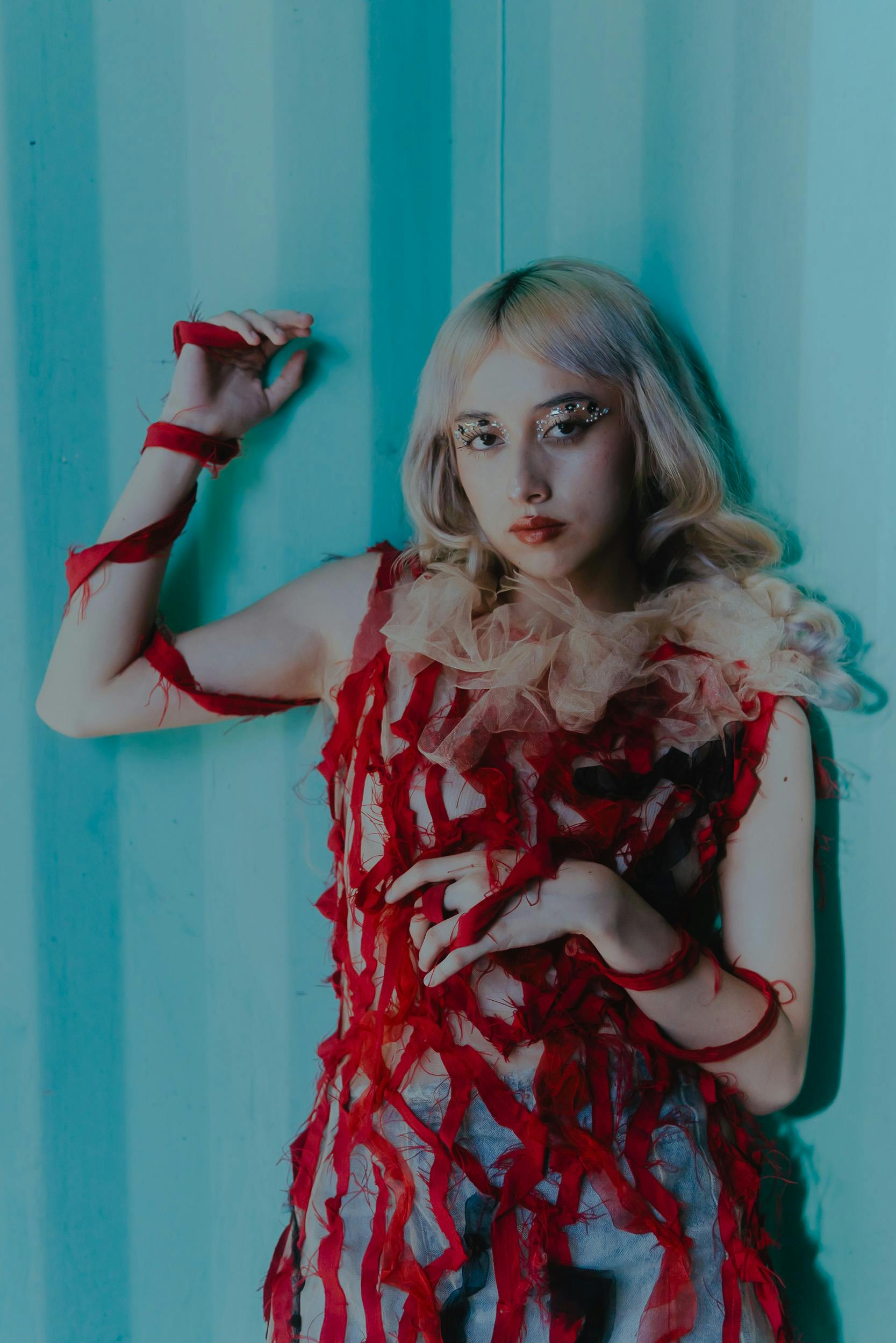 Female Model Wearing Red Ribbons · Free Stock Photo