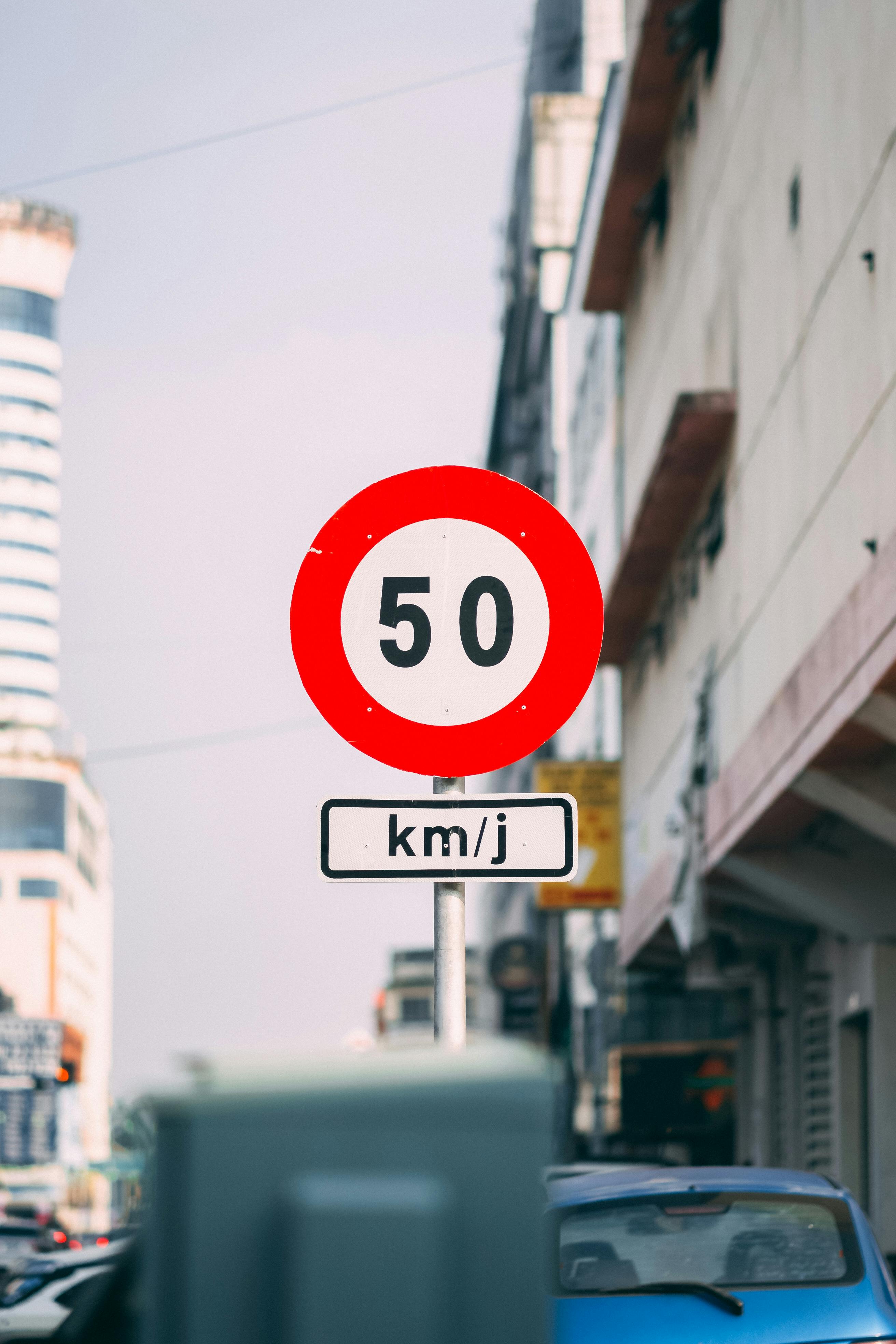 Speed limit sign in red color · Free Stock Photo