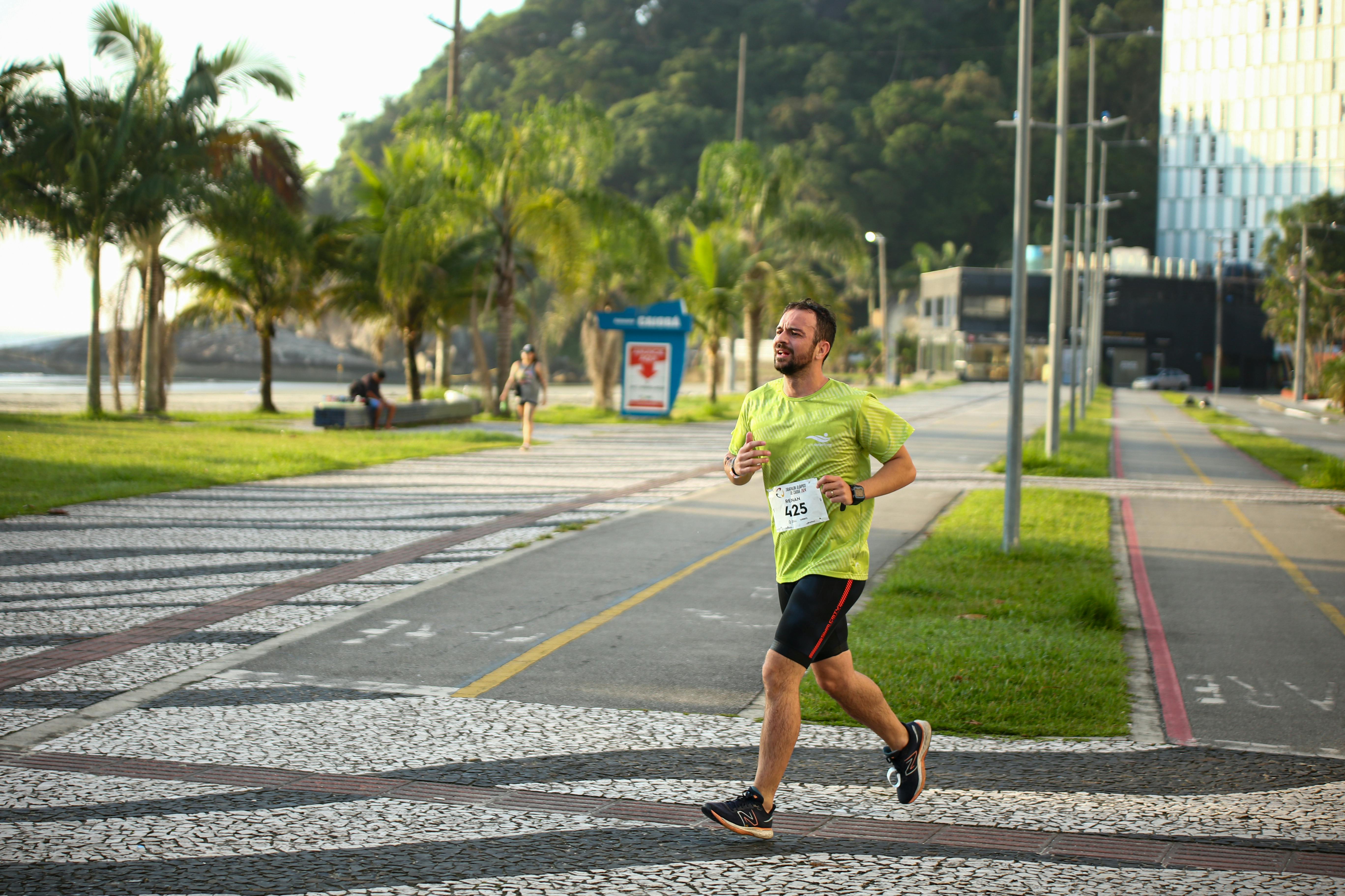 A Man Running on a Street in City · Free Stock Photo