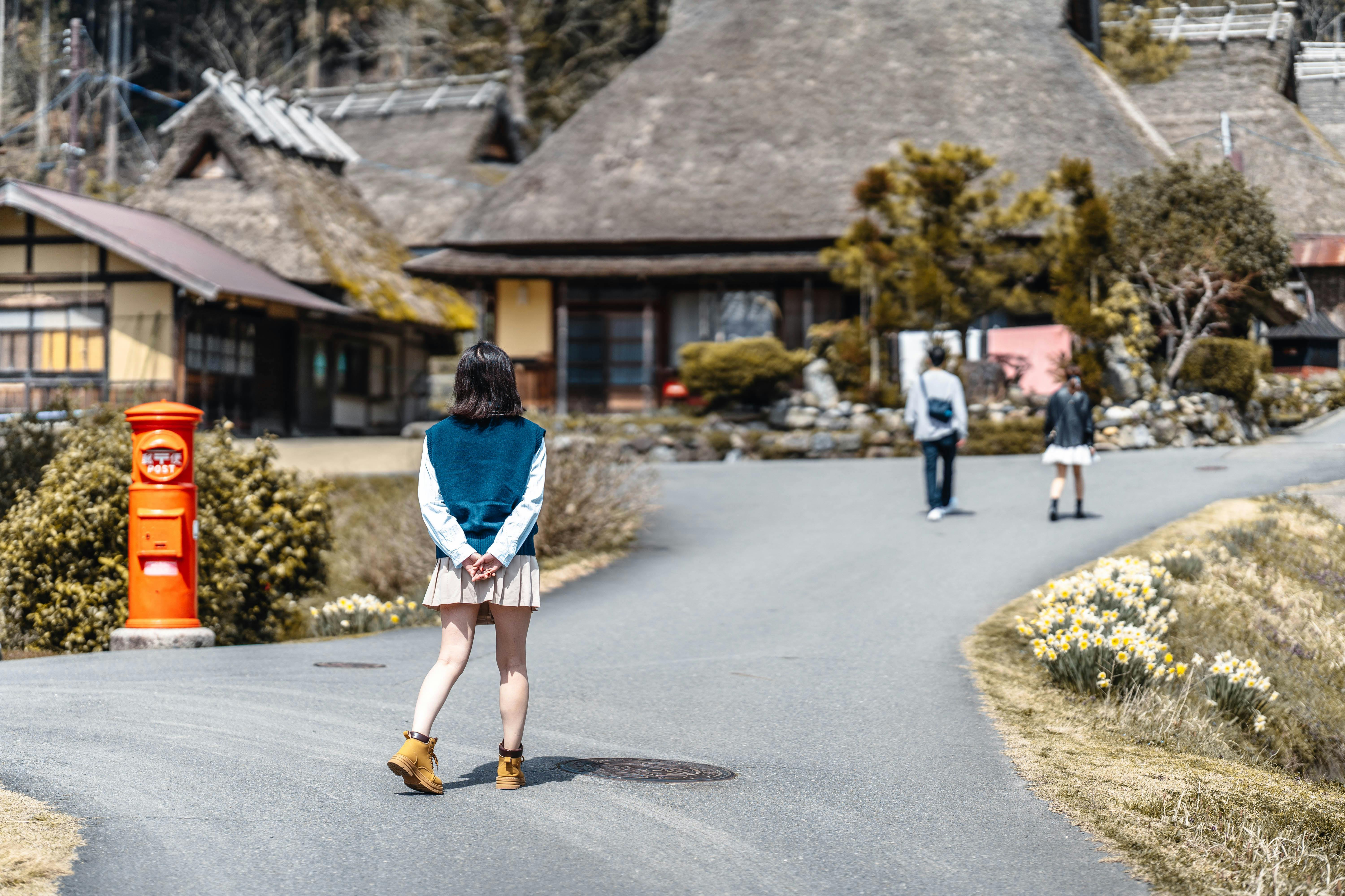 Back View of a Group of Children Walking on the Road · Free Stock Photo