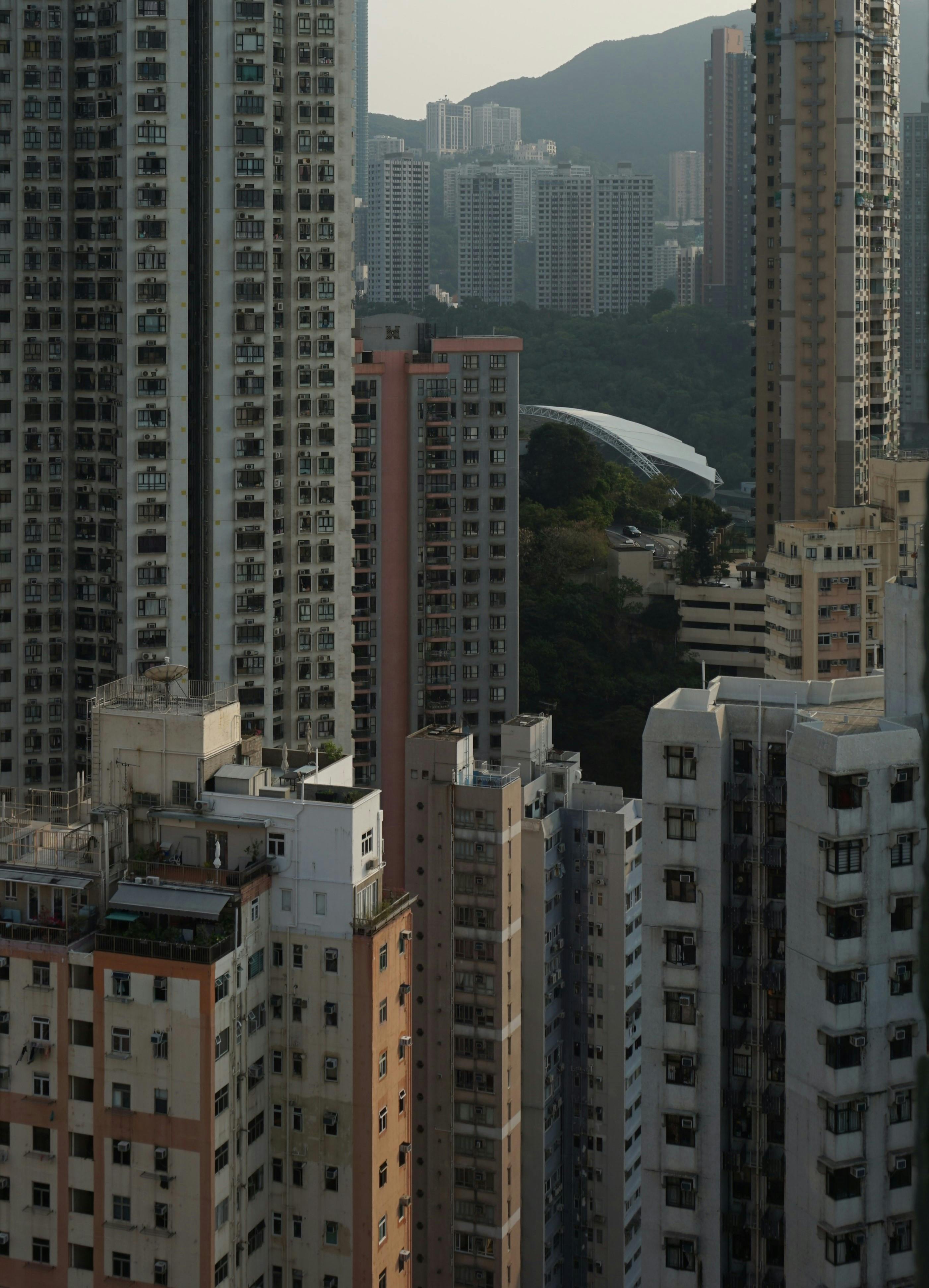 Tall Skyscrapers Hilly City · Free Stock Photo