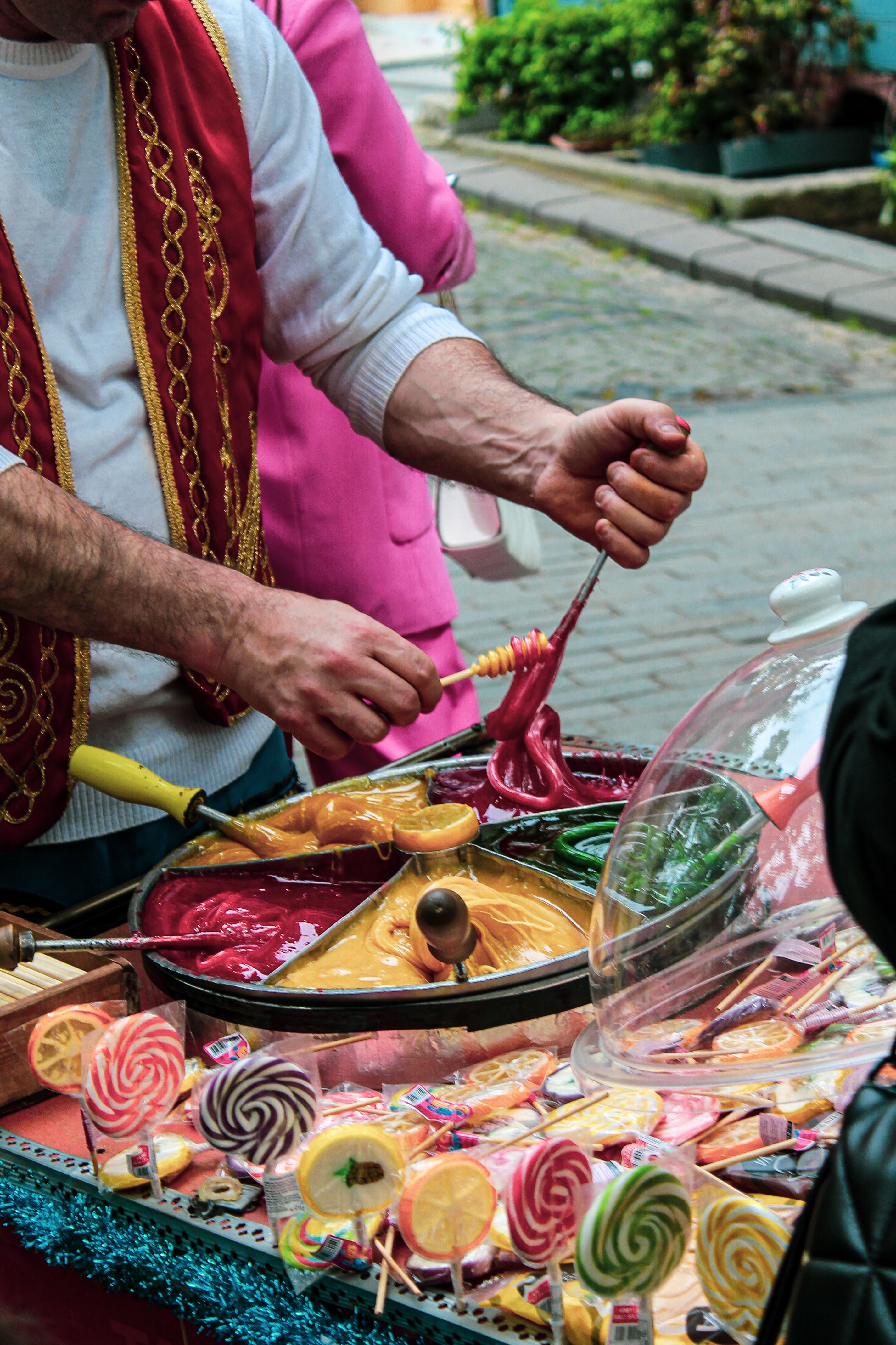 Man Selling Sweets at the Market · Free Stock Photo