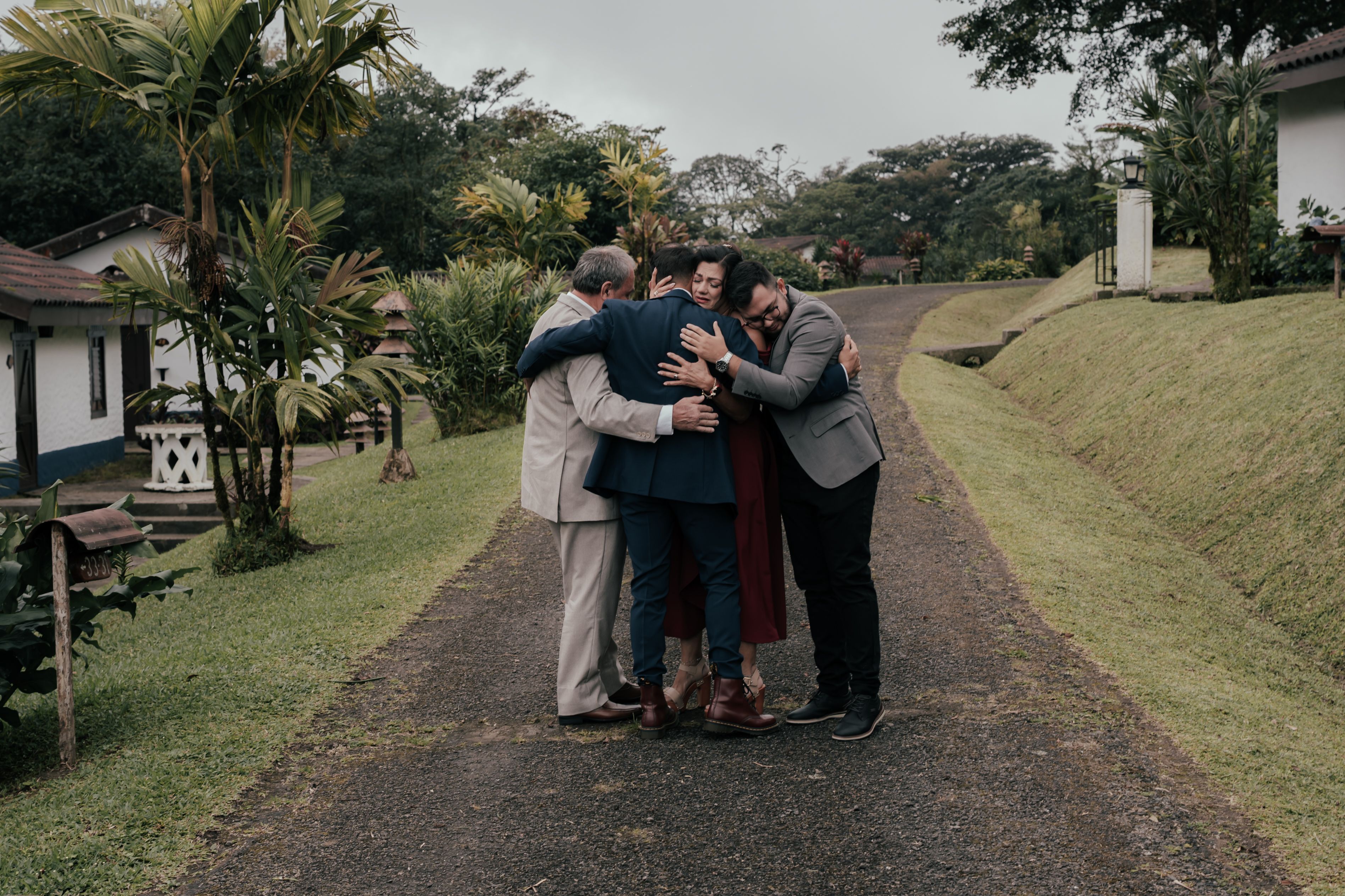 Wedding Guests Hugging the Groom in the Garden · Free Stock Photo