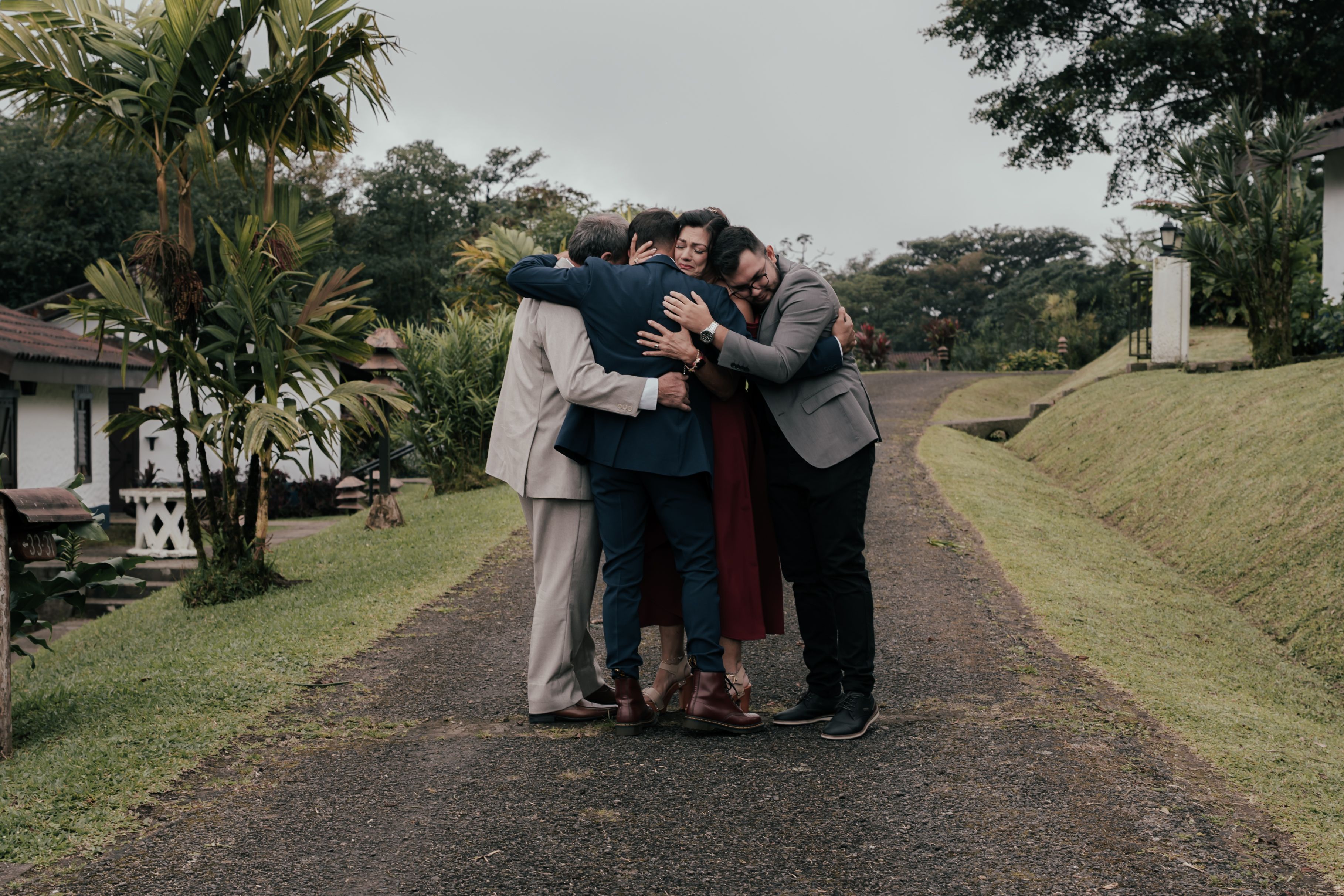 Wedding Guests Hugging the Groom in the Garden · Free Stock Photo