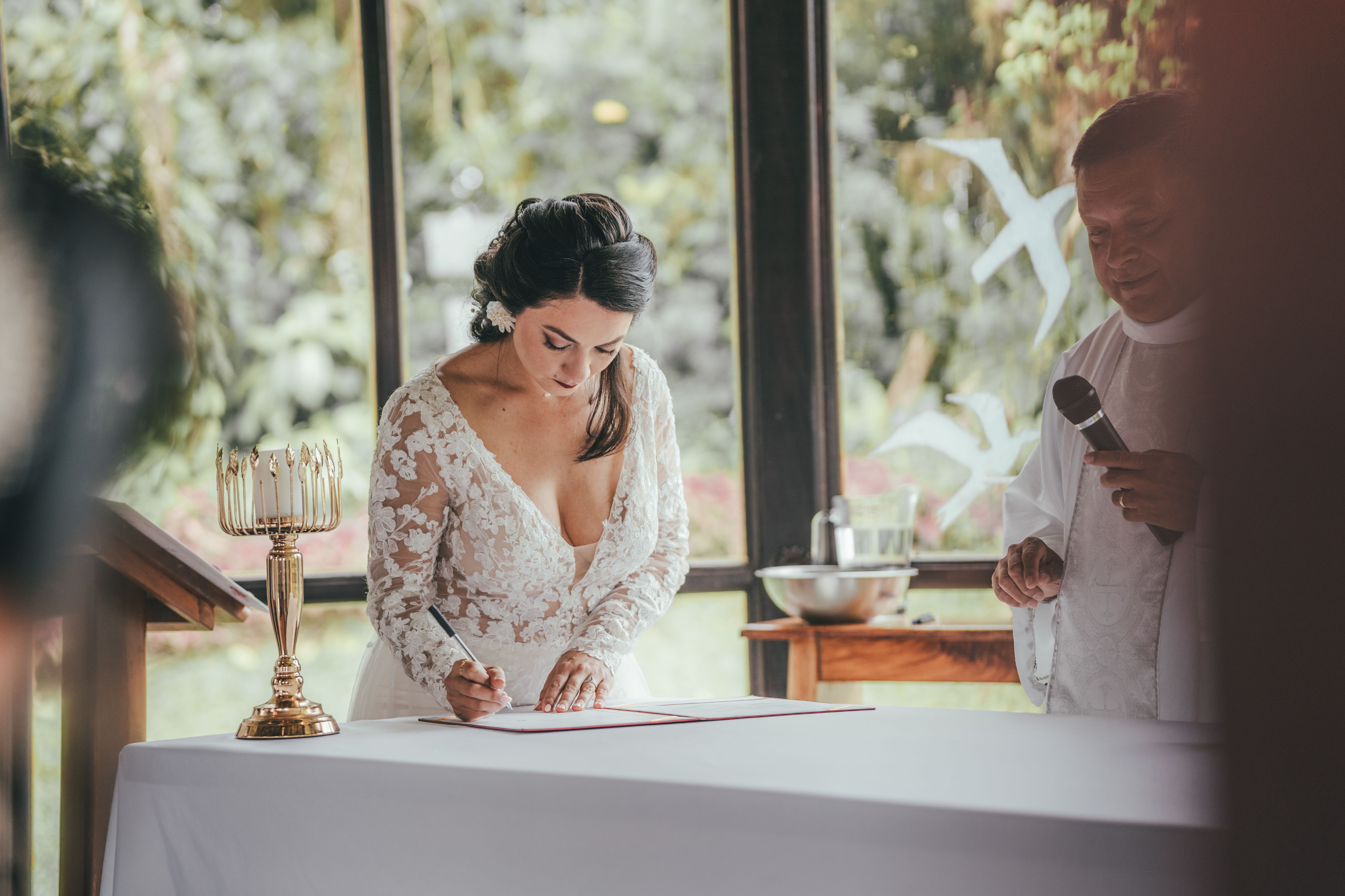 Bride Signing Marriage License · Free Stock Photo