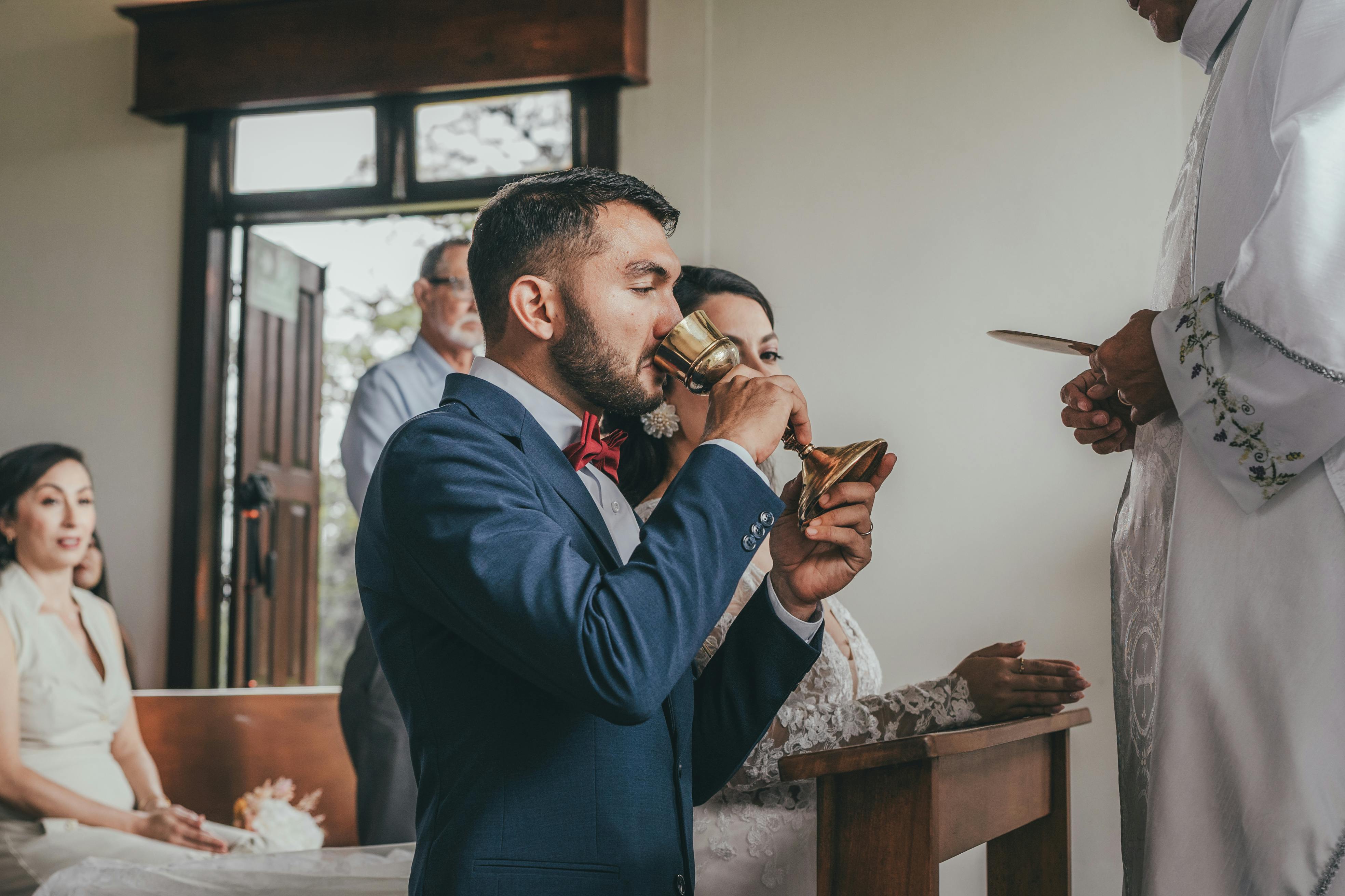 Groom Drinking Wine on Wedding Ceremony · Free Stock Photo