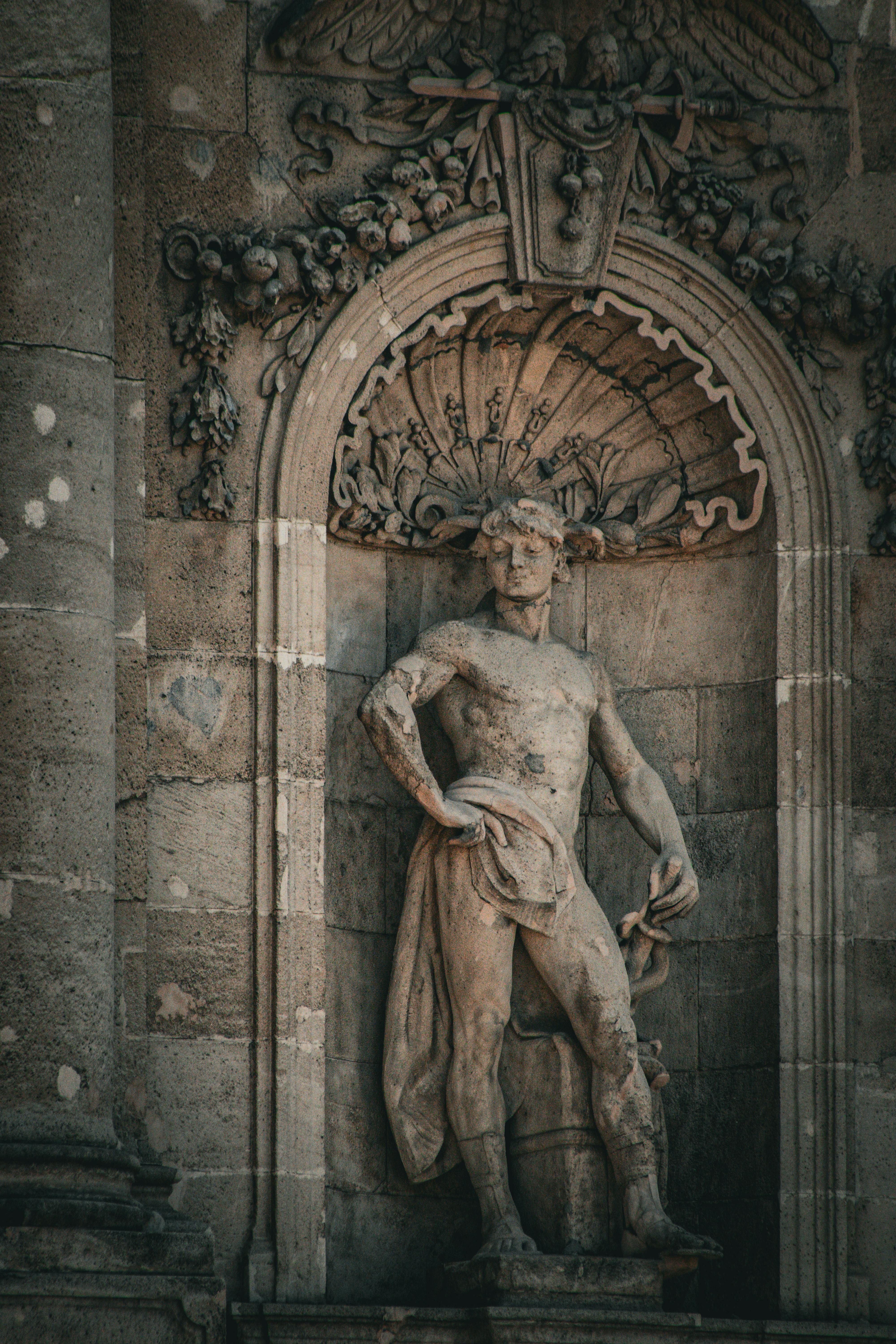 Statue of Standing Man with Hand on Hip · Free Stock Photo