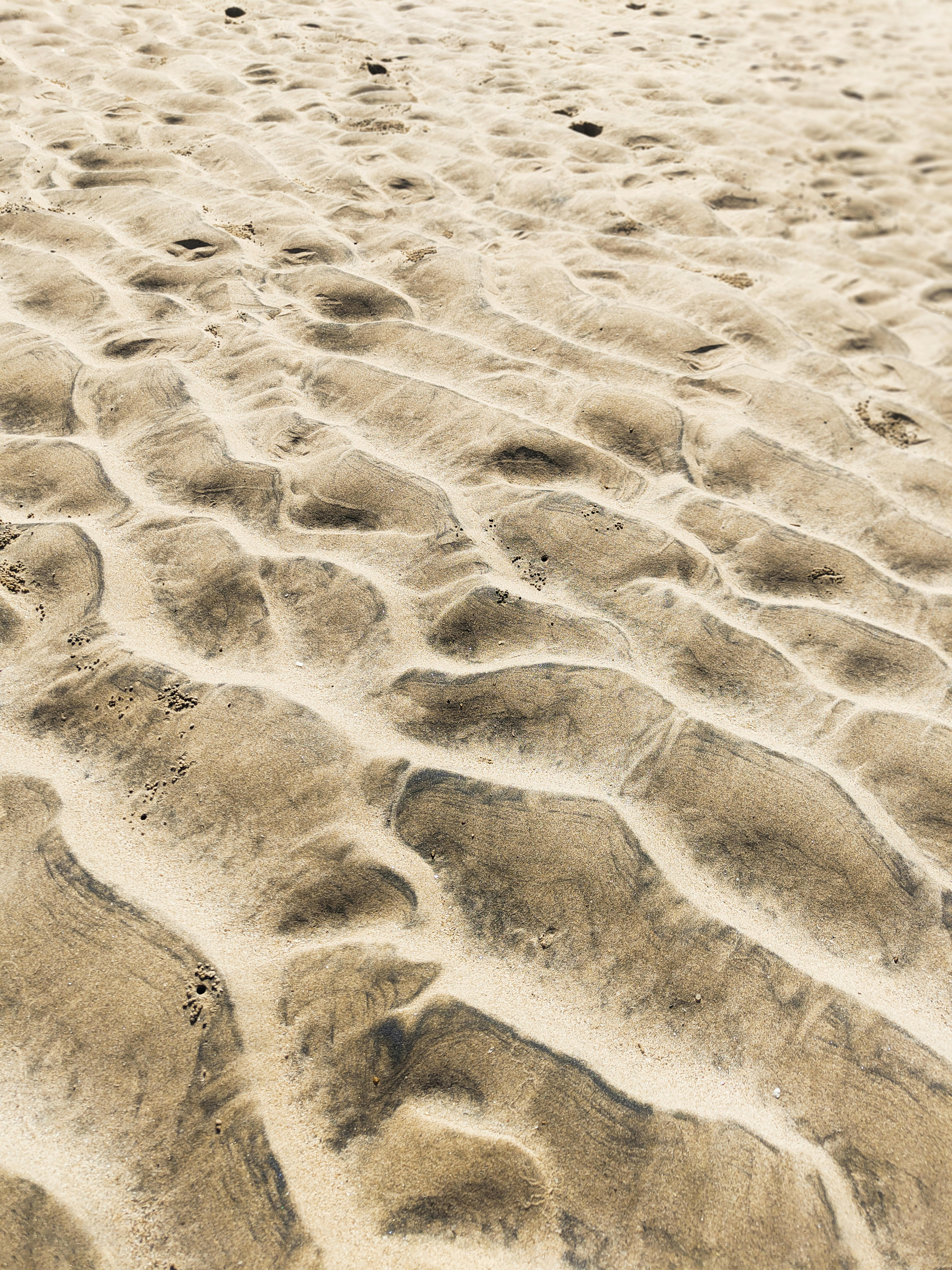 Shapes on Sand Surface on Beach · Free Stock Photo