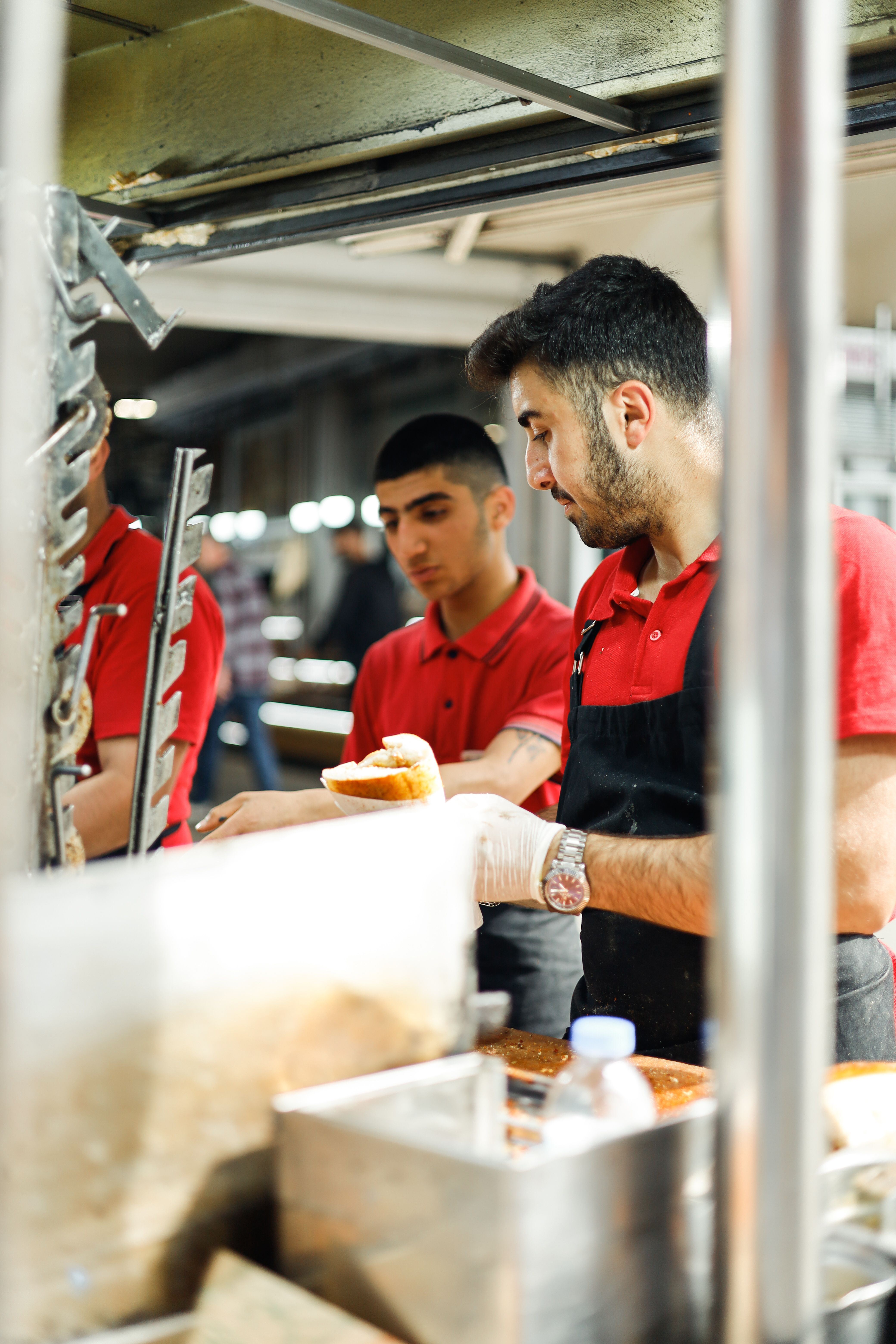 Men Working at Food Bar · Free Stock Photo
