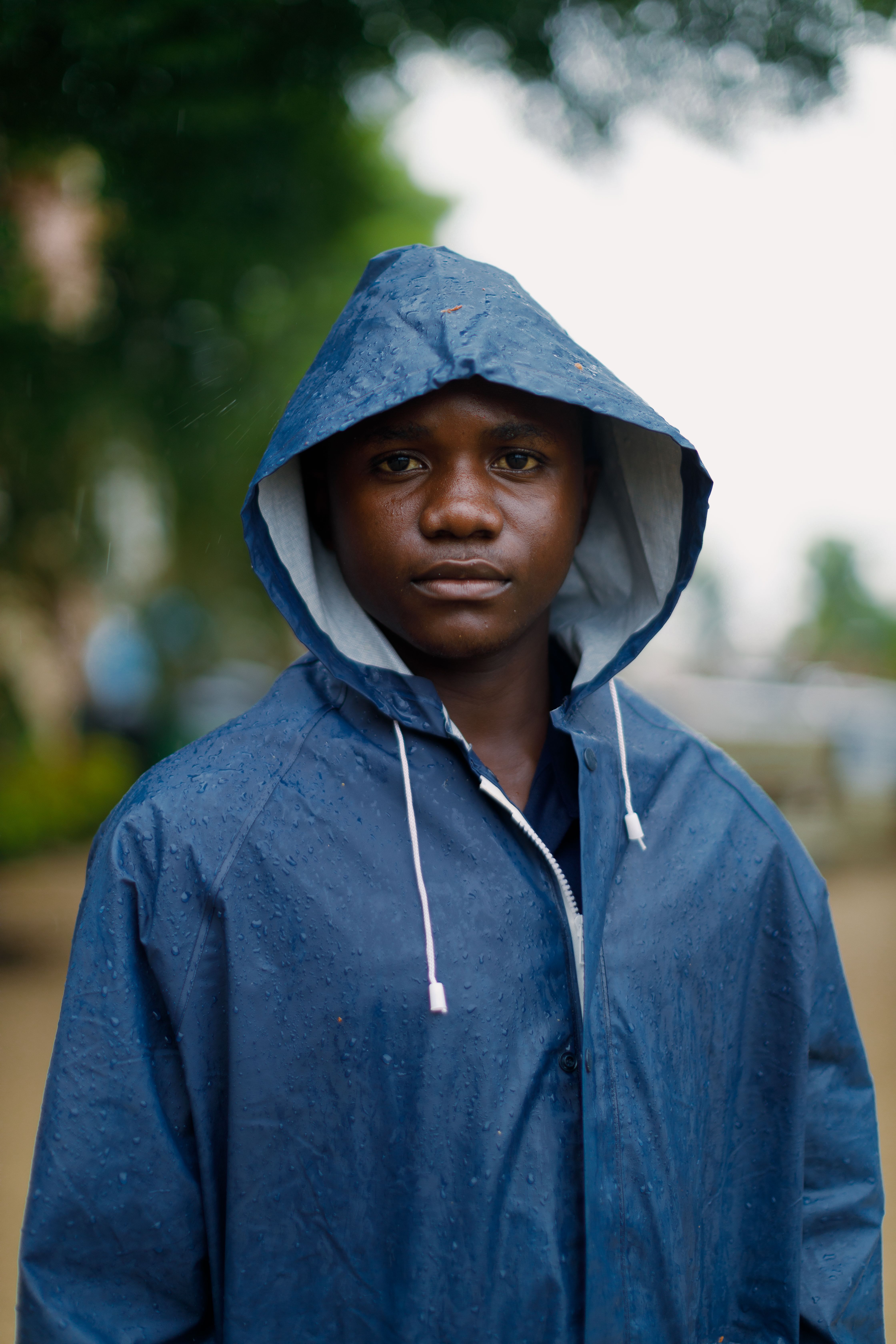 Person in Blue Raincoat · Free Stock Photo