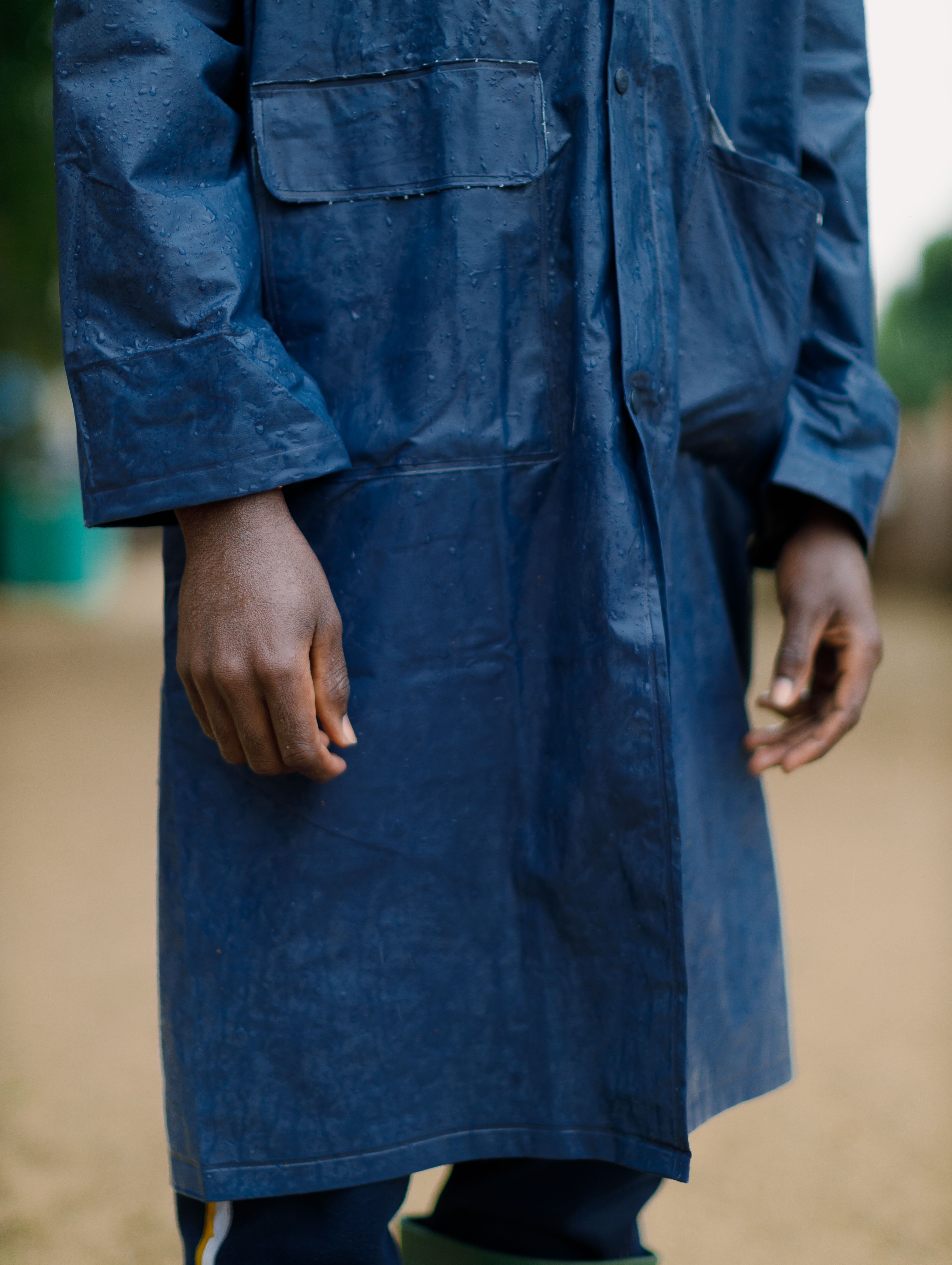 Person in Blue Raincoat · Free Stock Photo