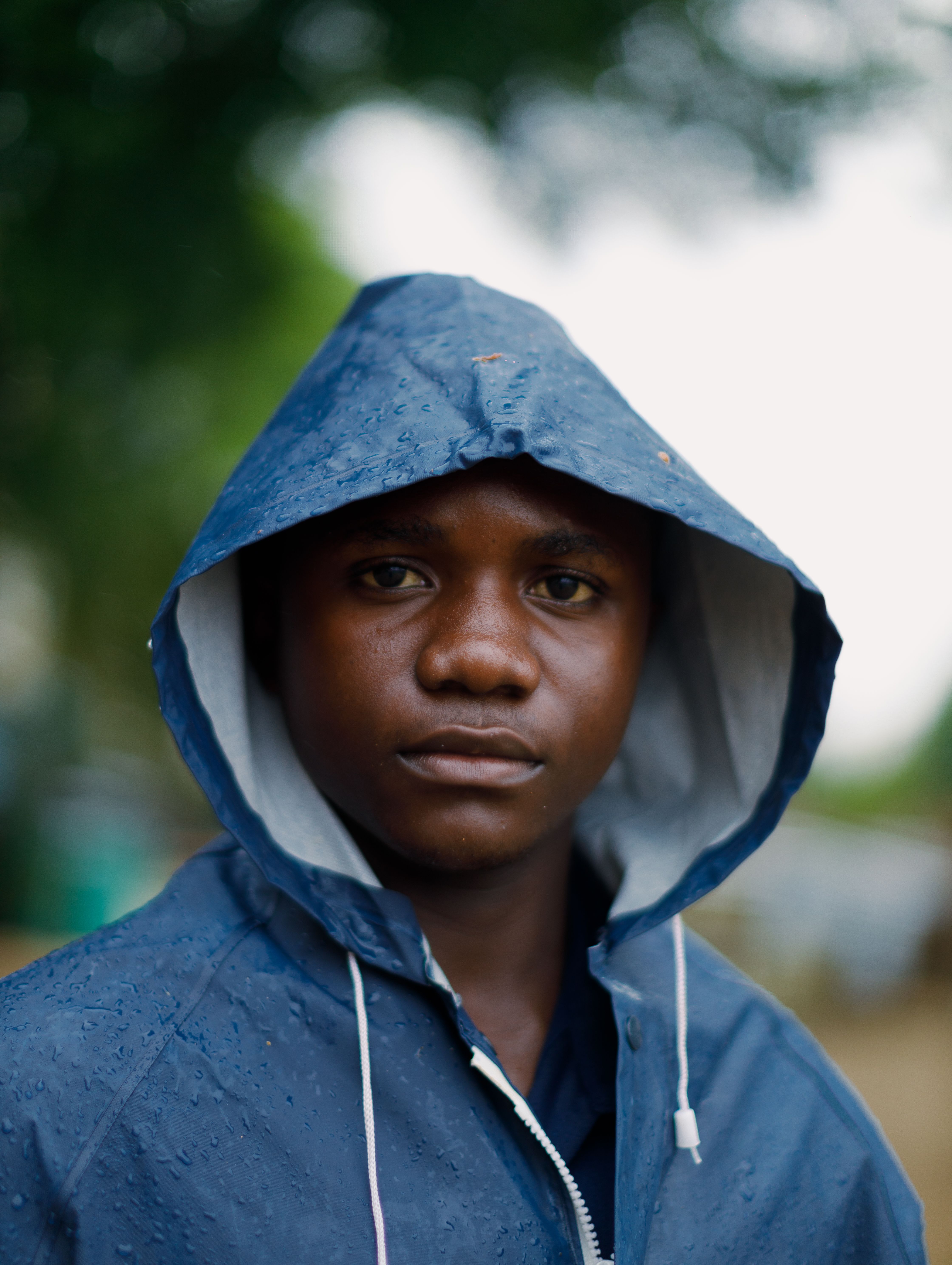 Person in Blue Raincoat · Free Stock Photo