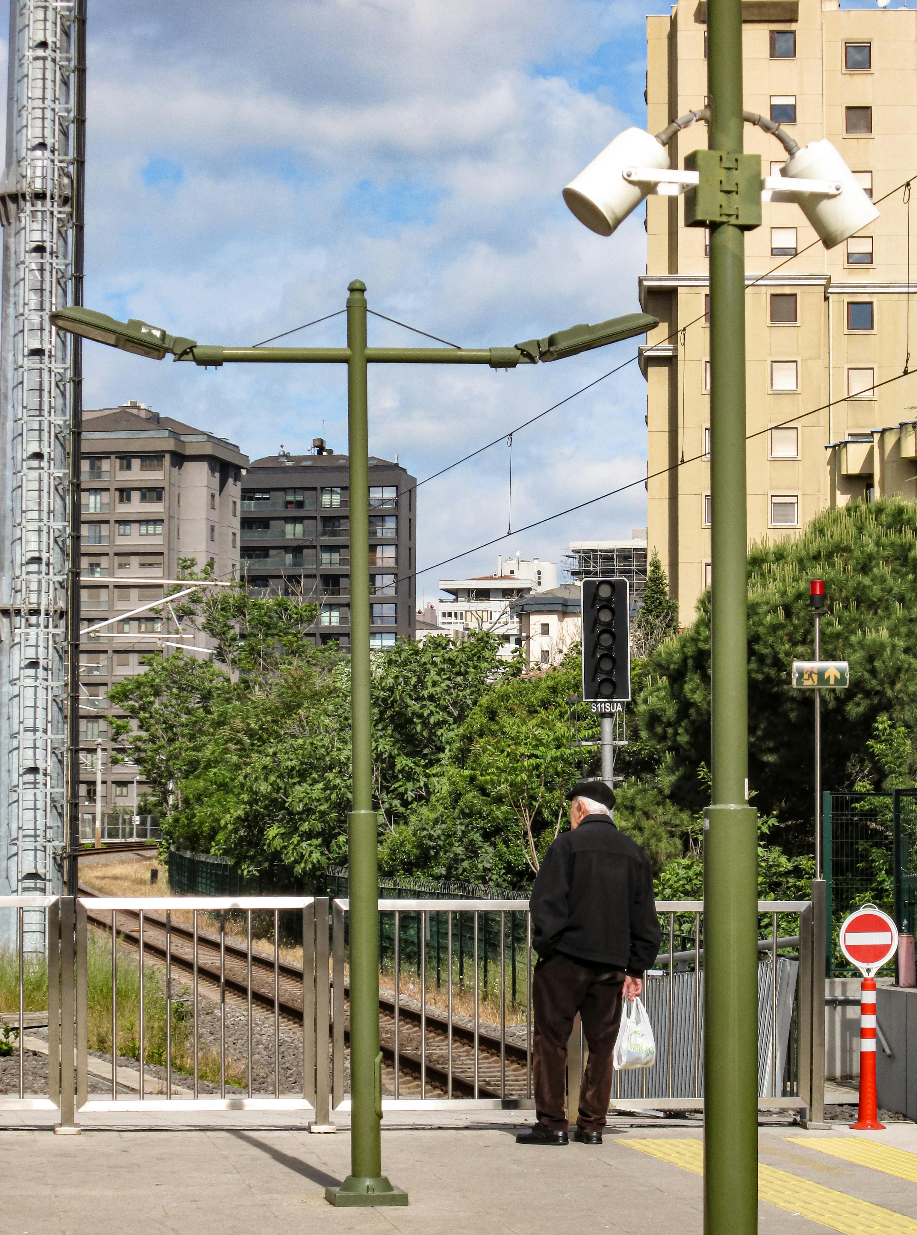 White Post Lamps Near Train Railway · Free Stock Photo