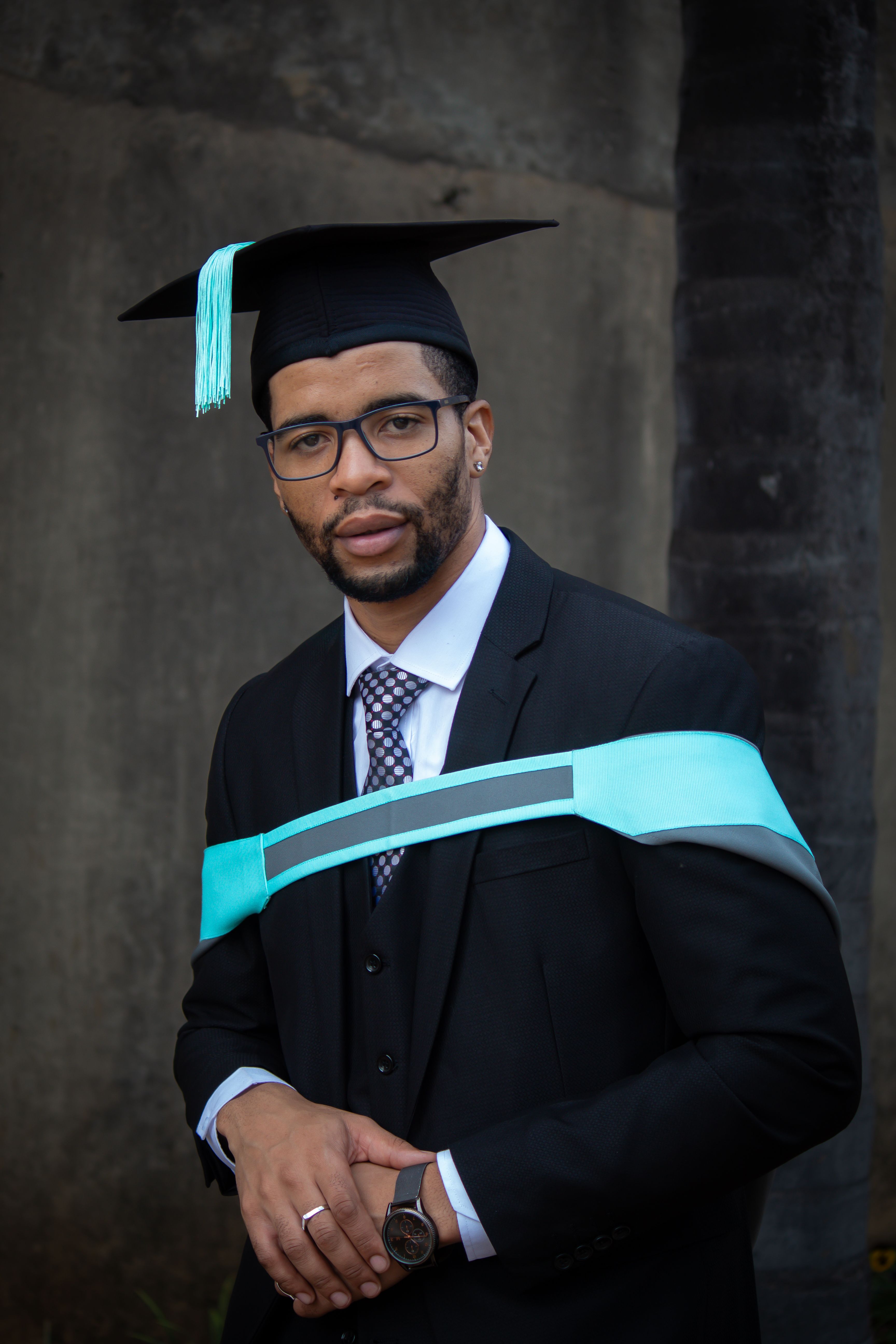 Man Wearing Graduation Gown · Free Stock Photo
