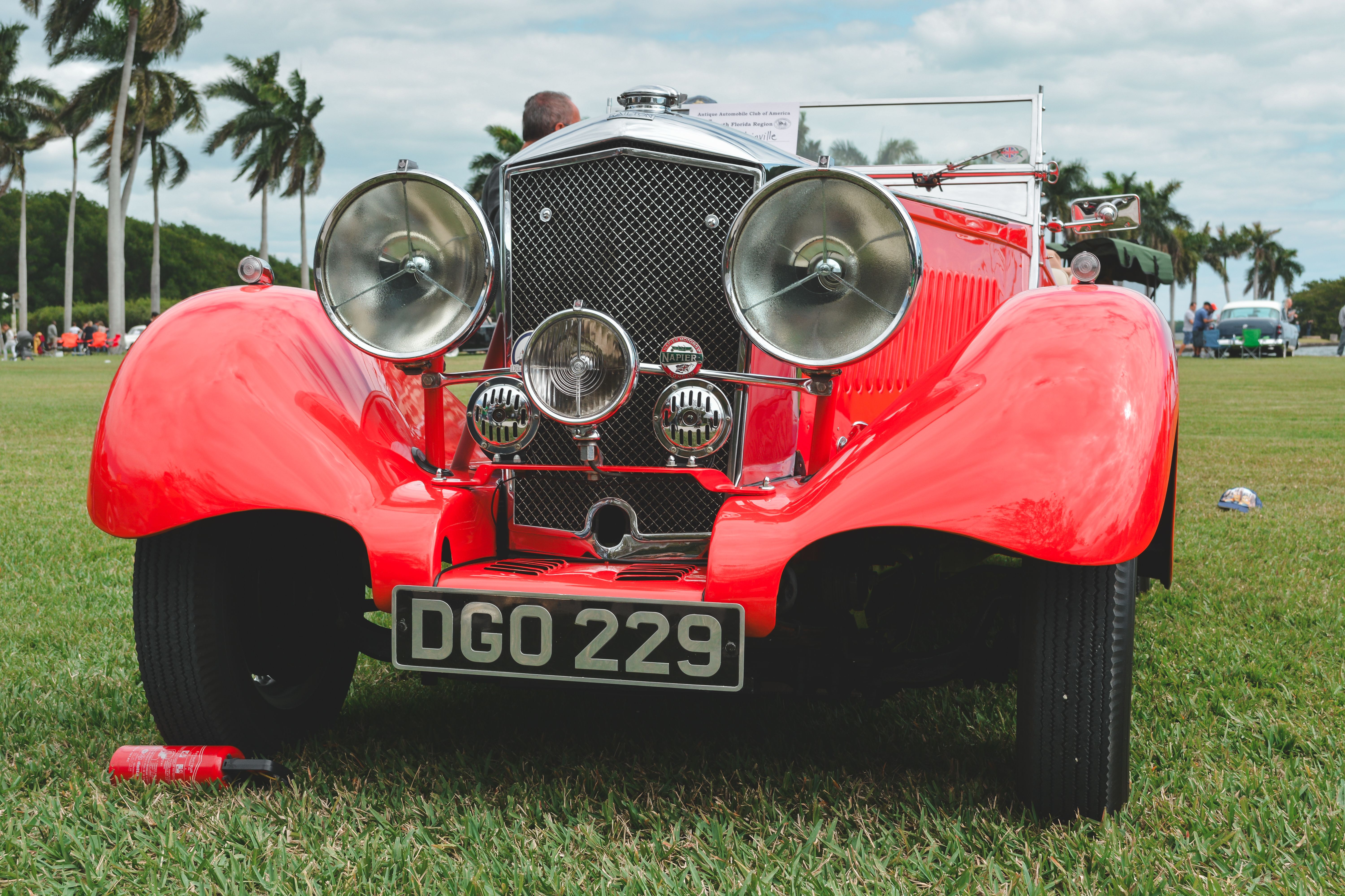 Red Car on a Field · Free Stock Photo