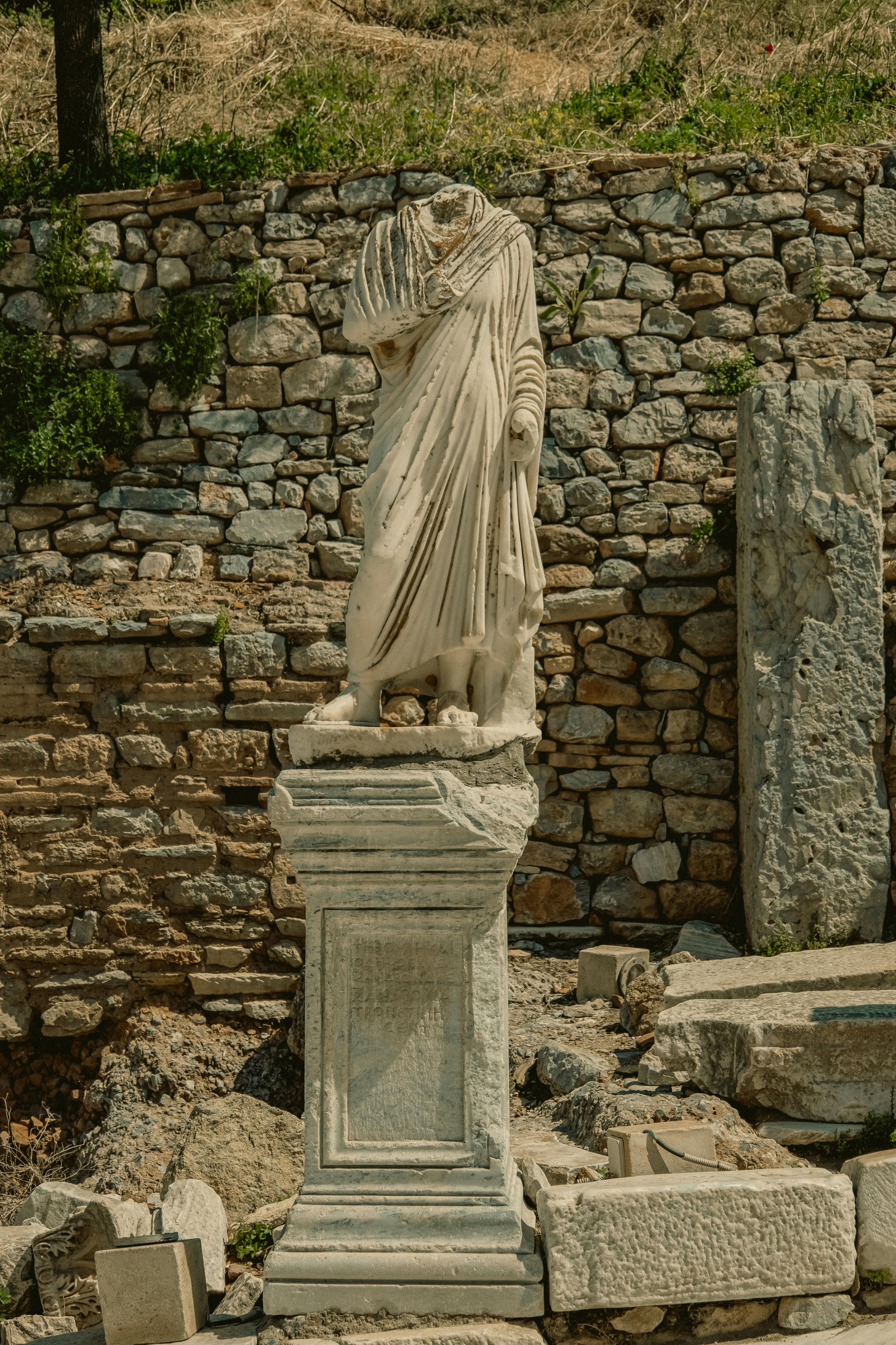 Old Sculpture Among Walls · Free Stock Photo