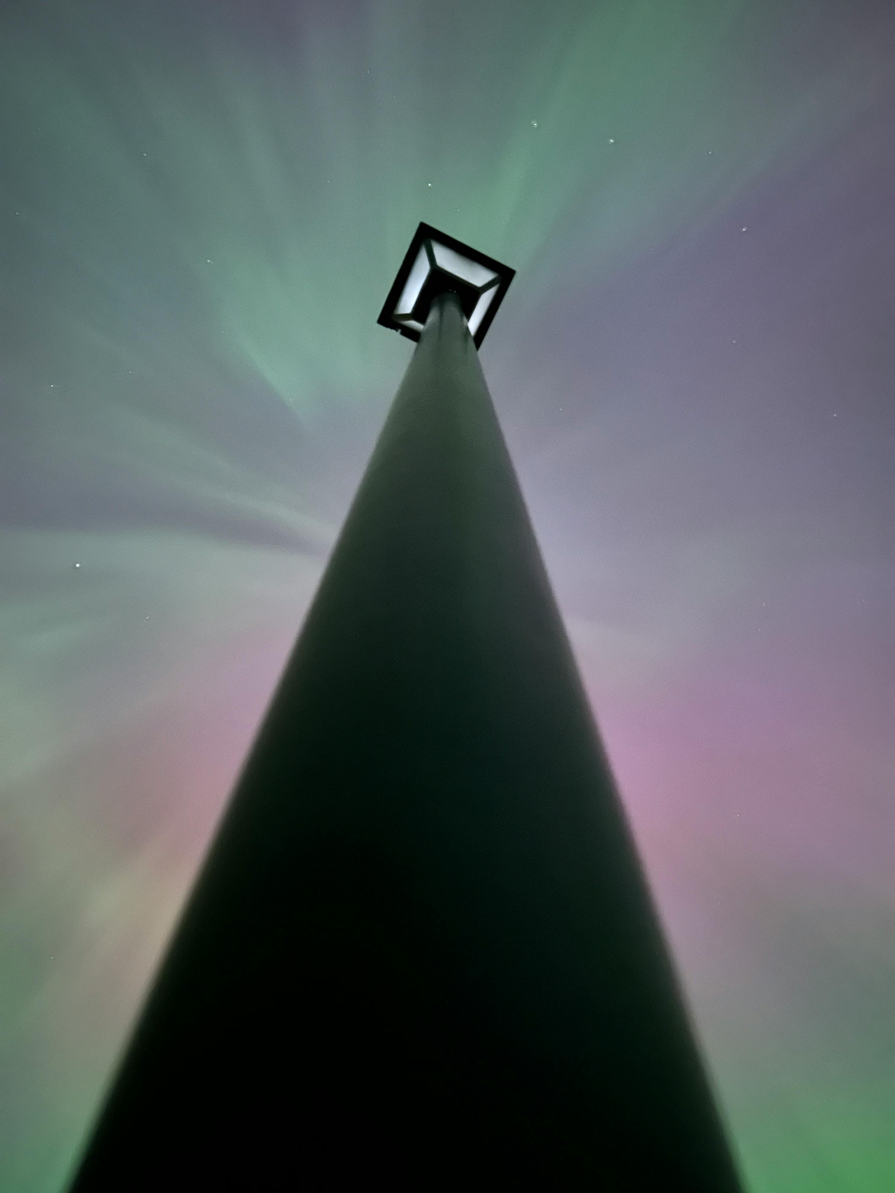 High Illuminated Tower from a Lower Perspective · Free Stock Photo