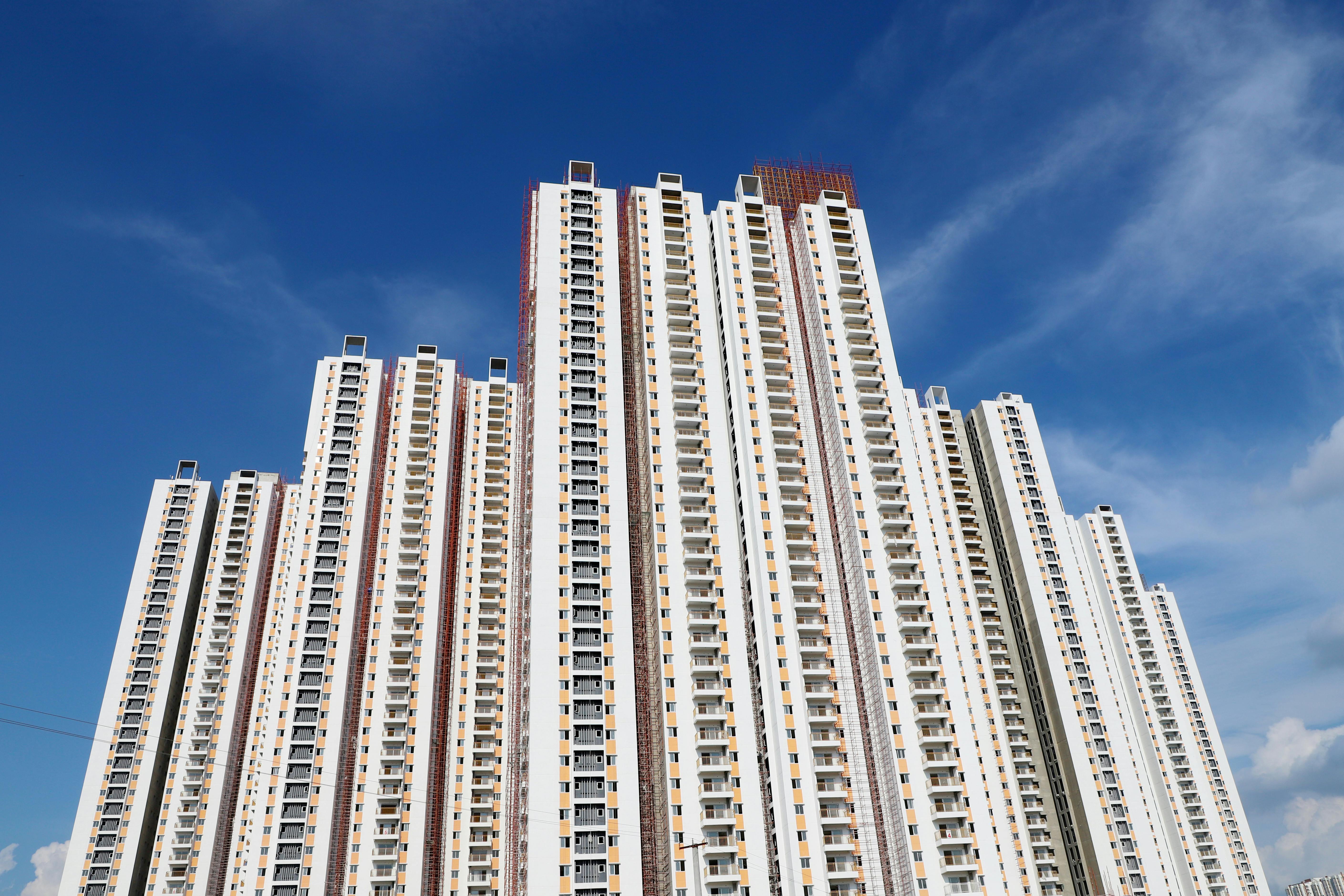 Gray, Red, and Orange Concrete Building · Free Stock Photo