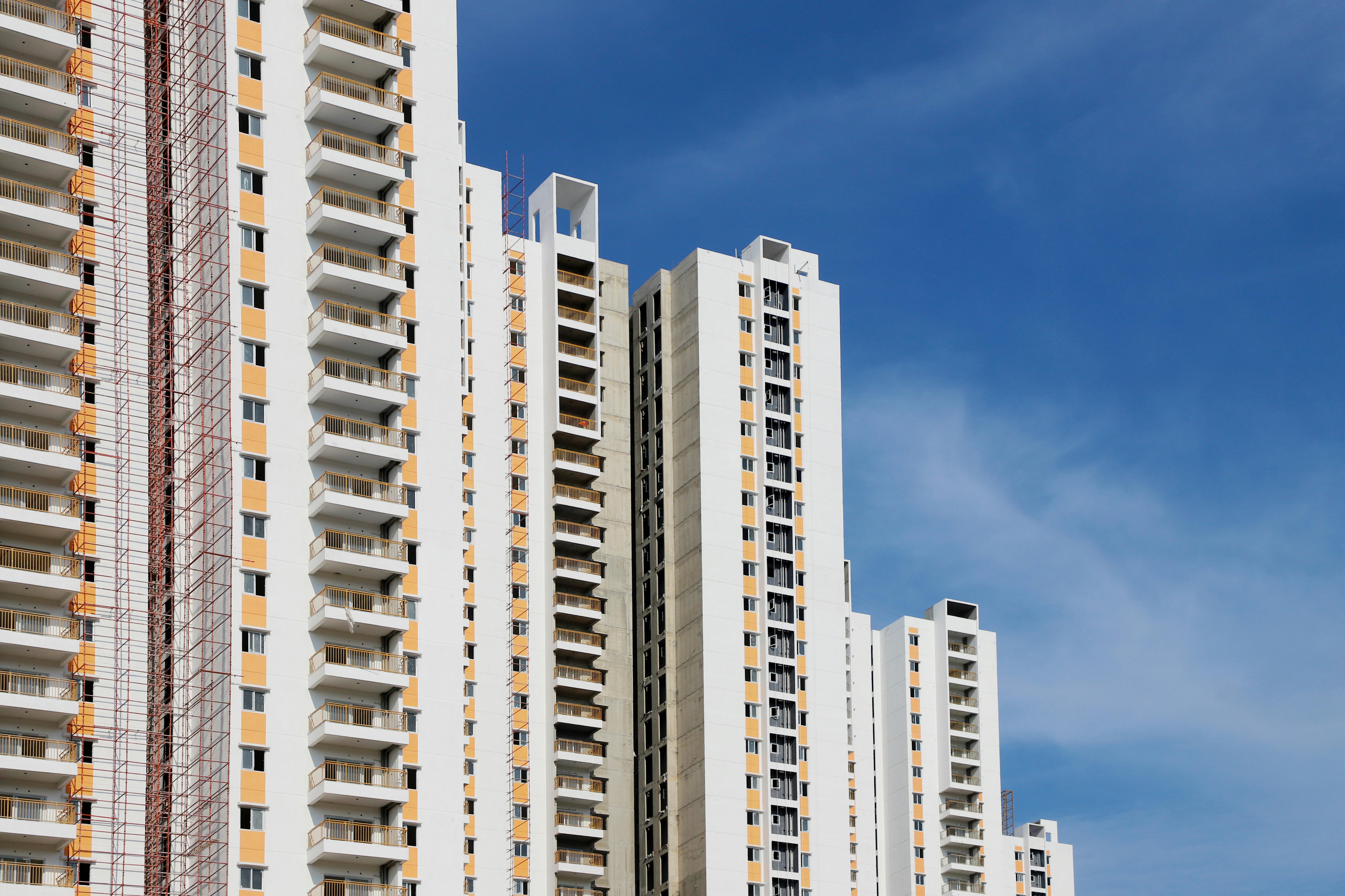 Facade of a Modern Apartment Building Complex · Free Stock Photo