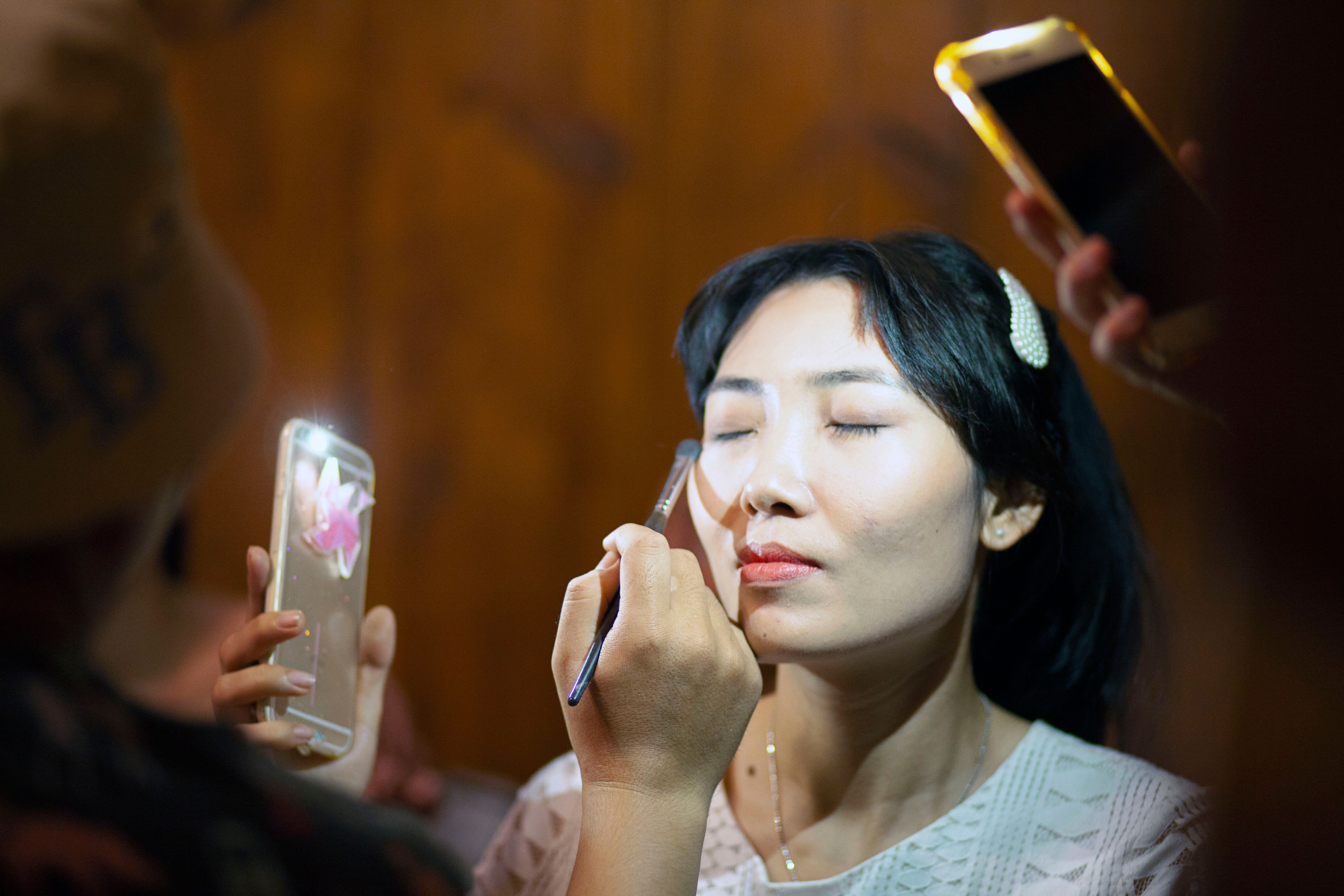 Beautician Put Makeup on Woman Face · Free Stock Photo