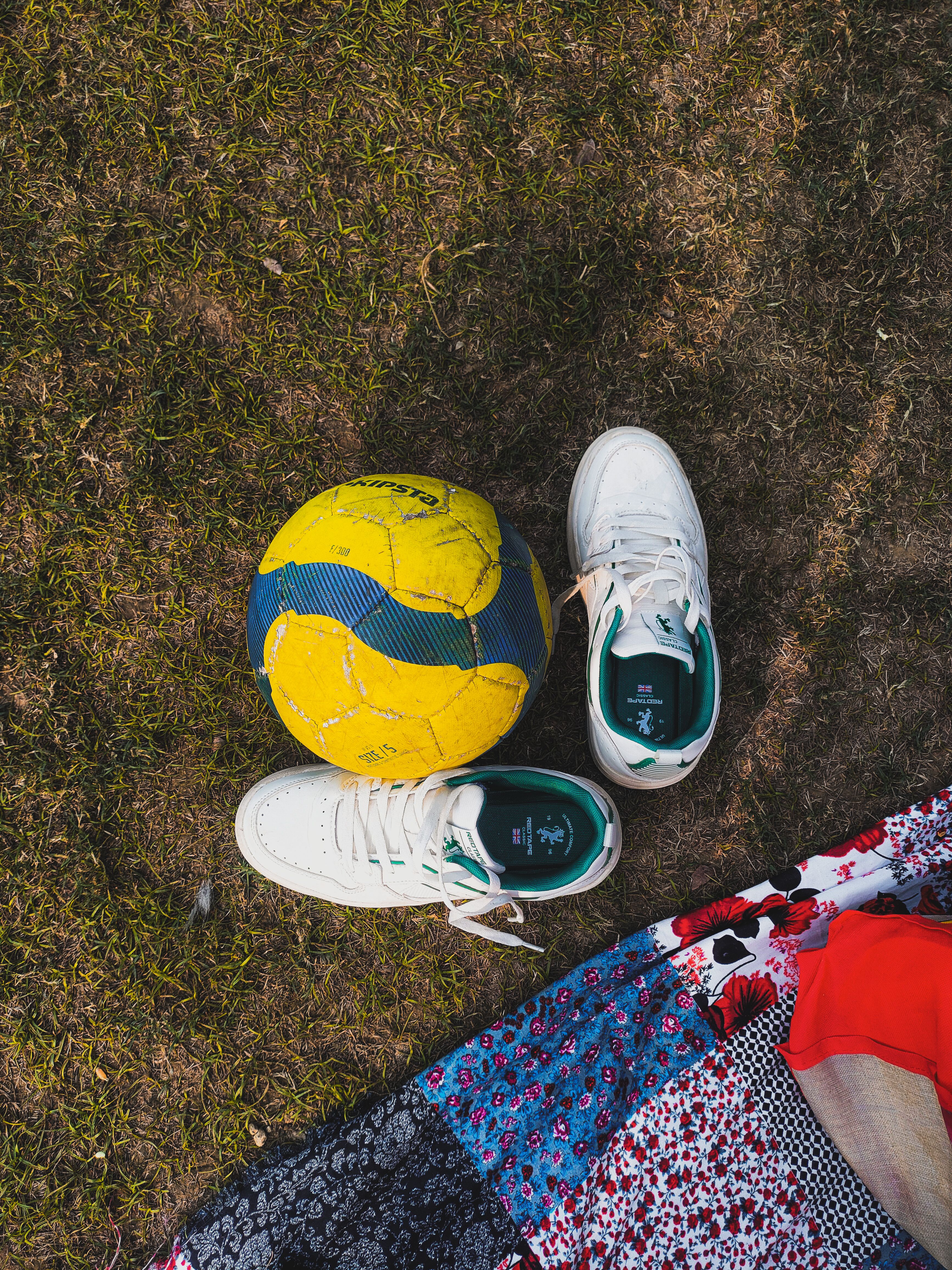 Ball and White Shoes on Grass · Free Stock Photo